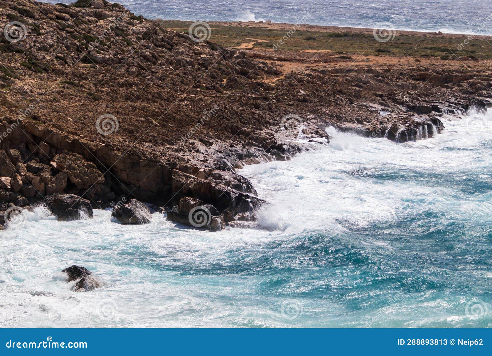 View of a Rocky Ocean Shore with Water Splashing from the Waves Stock ...