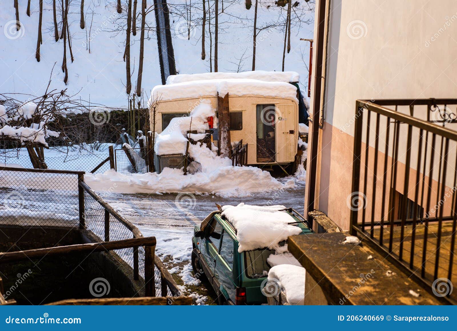 View of a Roulotte Caravan and Car in the Snow during Winter Stock ...