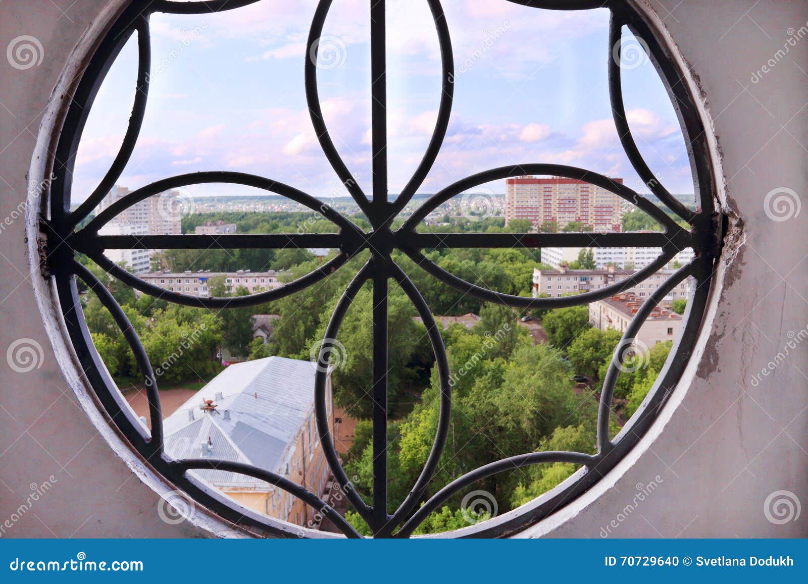 View through Round Window of Residential Buildings Stock Photo - Image ...