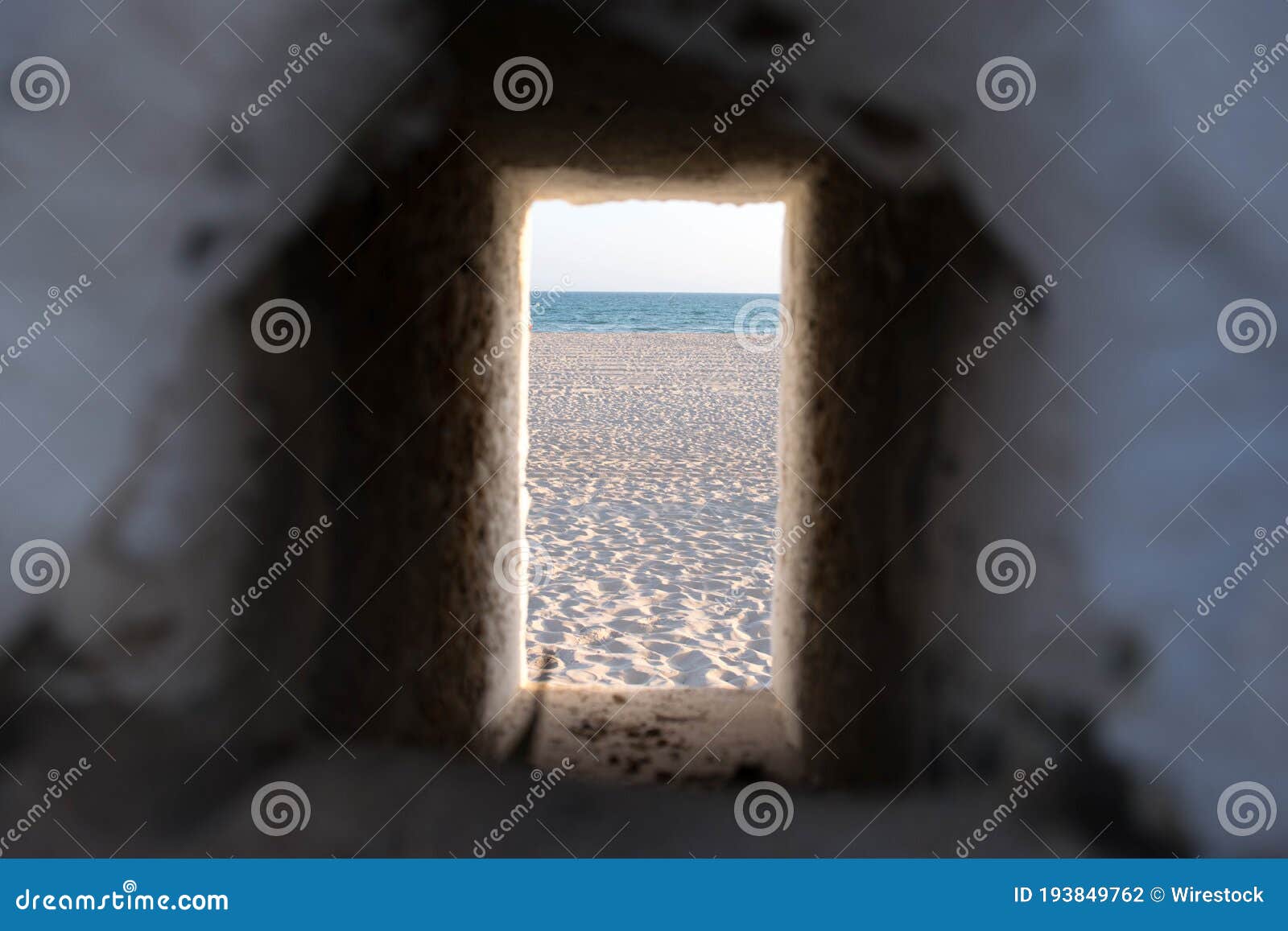 View of a Sandy Beach from Narrow Windows Stock Photo - Image of shore ...