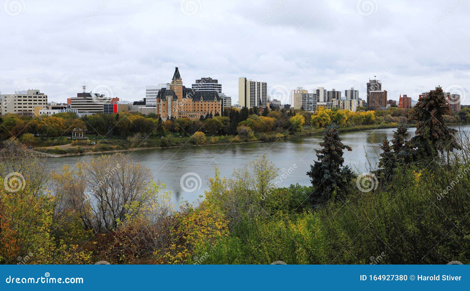 View of Saskatoon, Canada Skyline by River Stock Photo - Image of ...