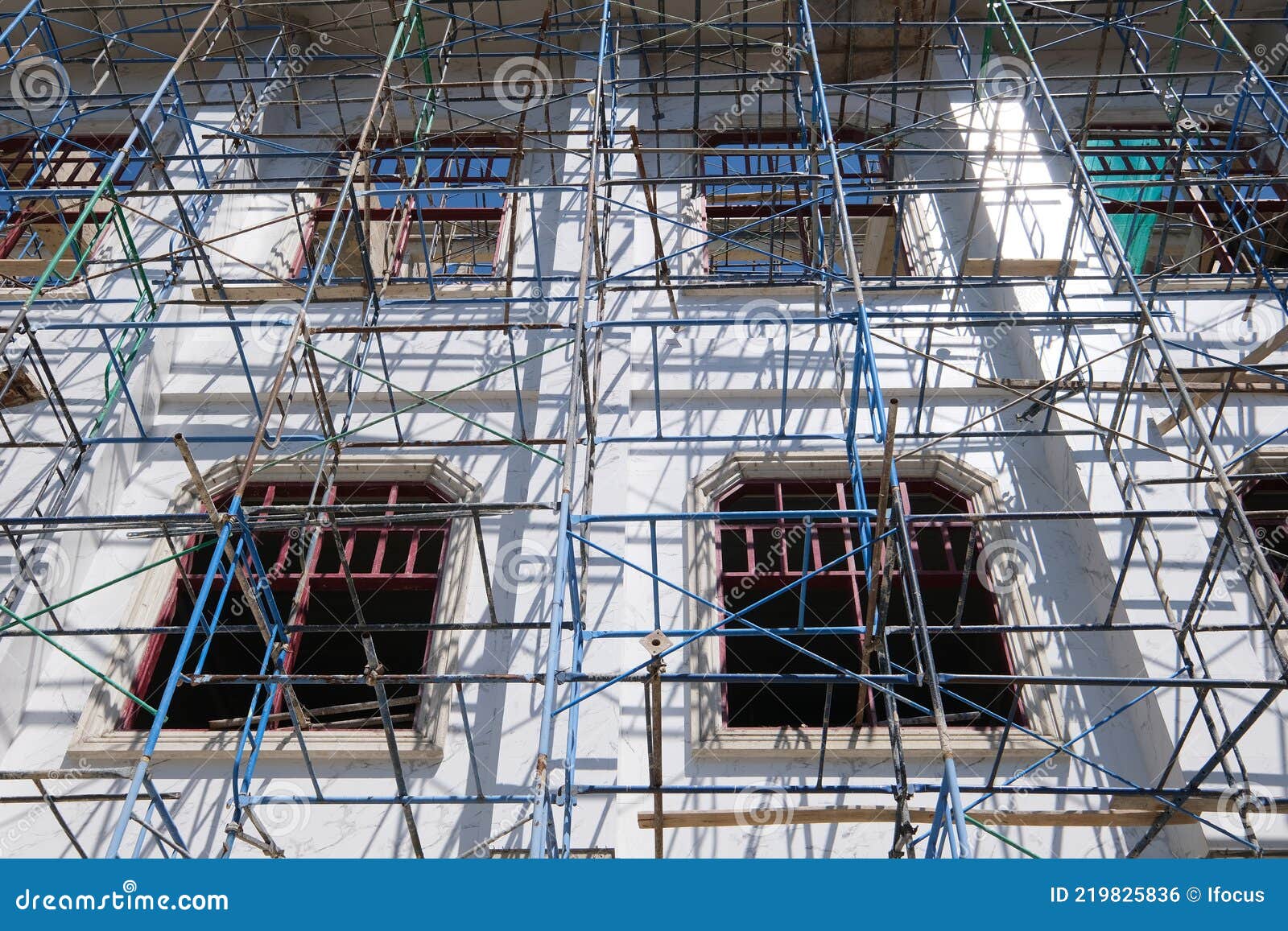 Building Under Construction with Scaffold in Front Stock Photo - Image ...