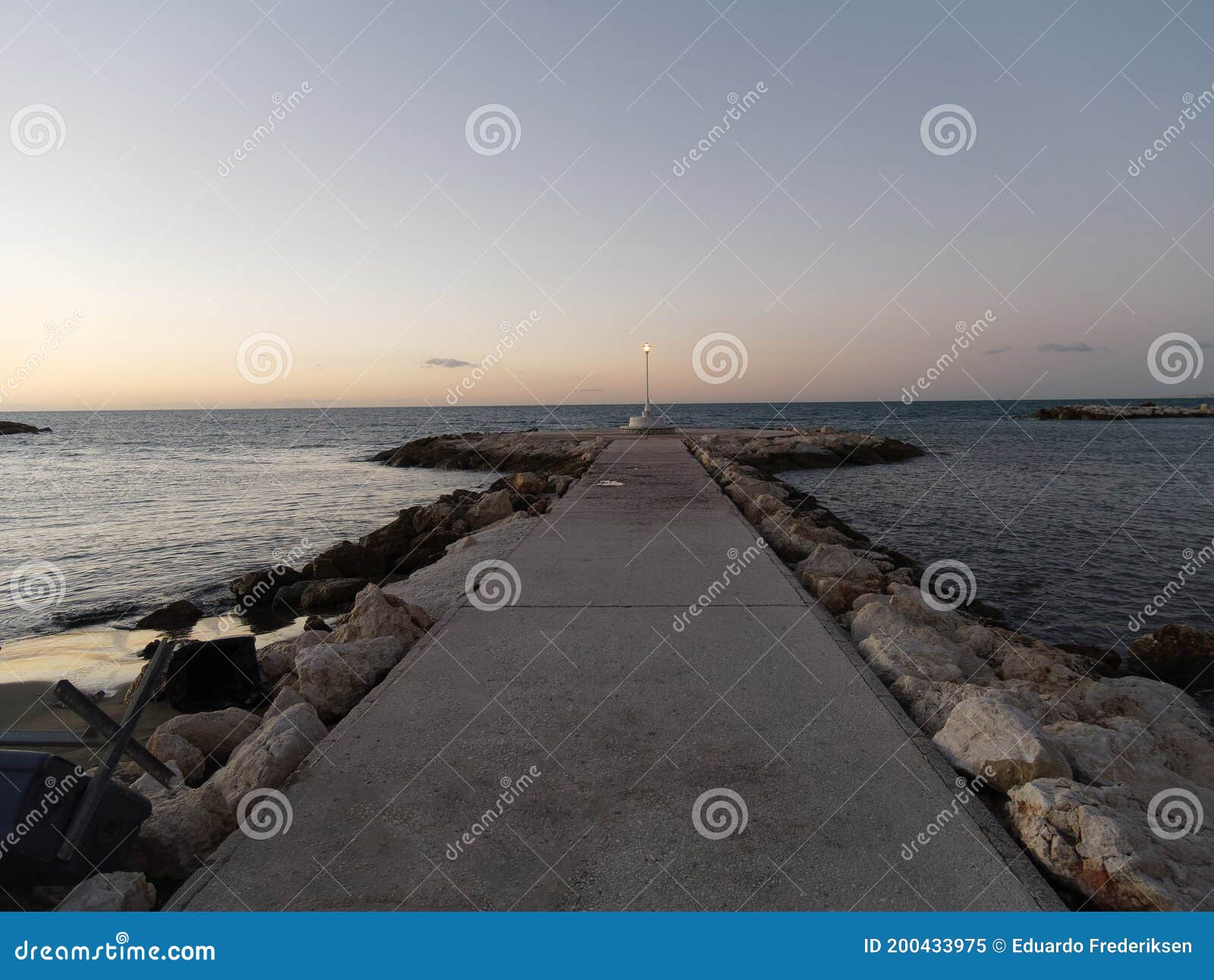 View of the Sea and Lamppost on the Pedregalejo Beach at Dusk Stock ...