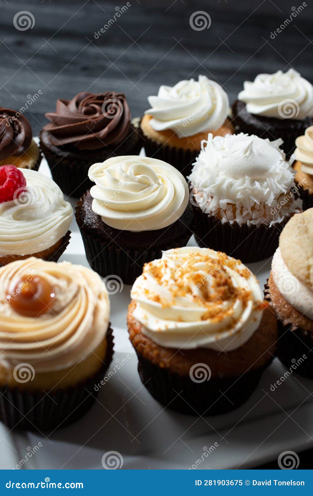 Assorted cupcakes stock image. Image of cake, decadent - 281903675