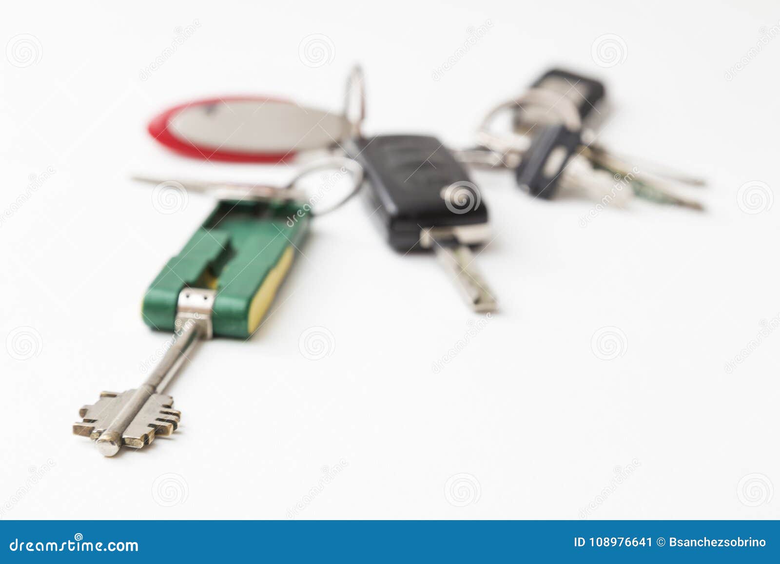 Several Key Rings with Different Keys on White Background Stock Image ...