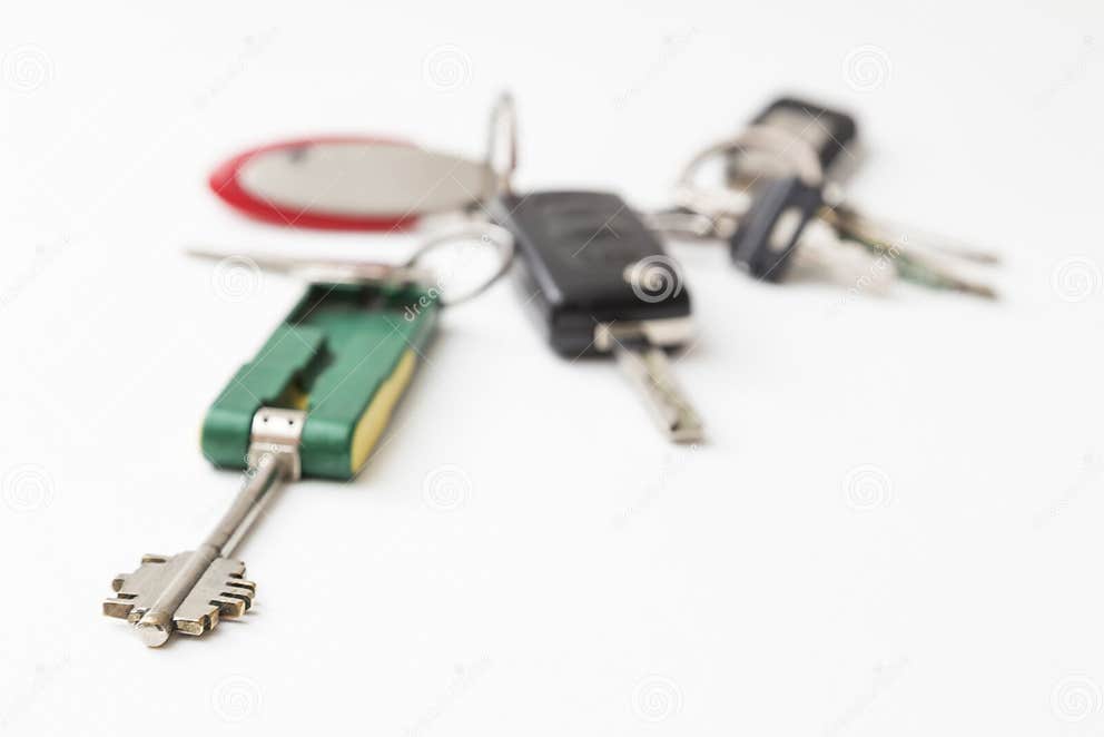 Several Key Rings with Different Keys on White Background Stock Image ...