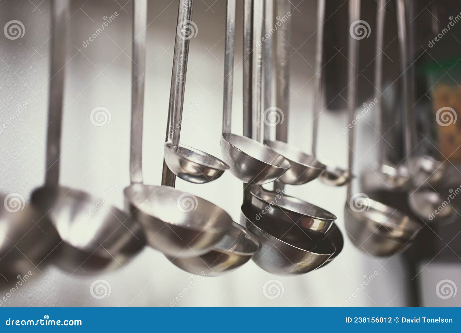 Hanging ladles stock photo. Image of silverware, setting - 238156012