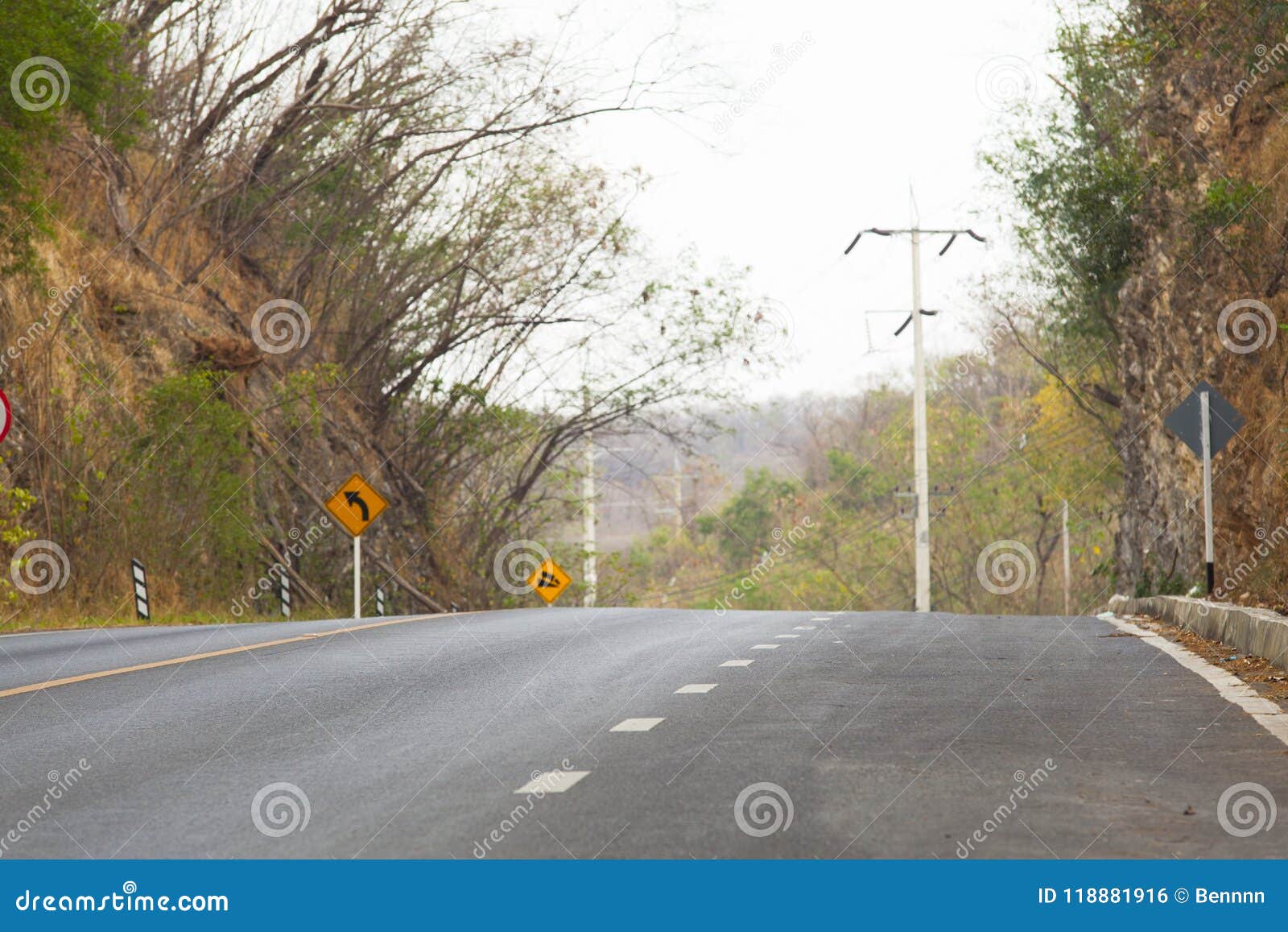 Sharp Curve Road in Forest Hill Stock Photo - Image of nameboard, curvy ...