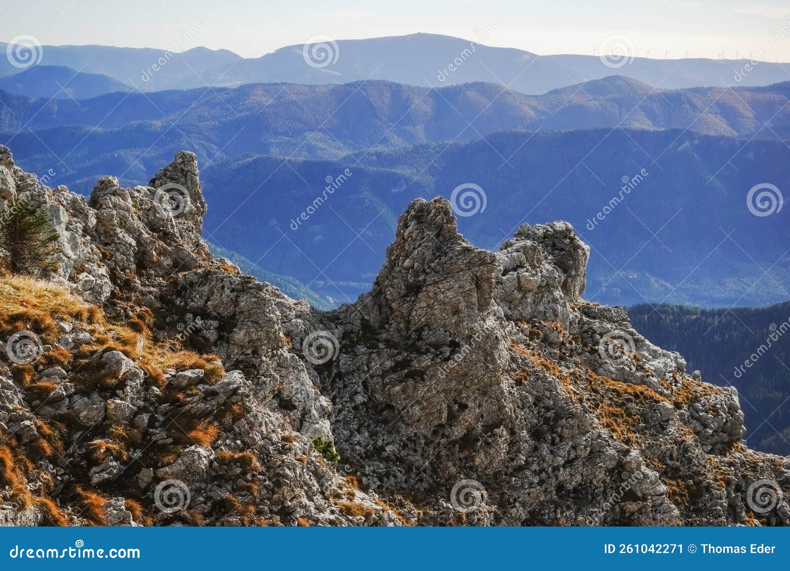 View through Sharp Rock into a Valley with Lot Mountains Stock Image ...