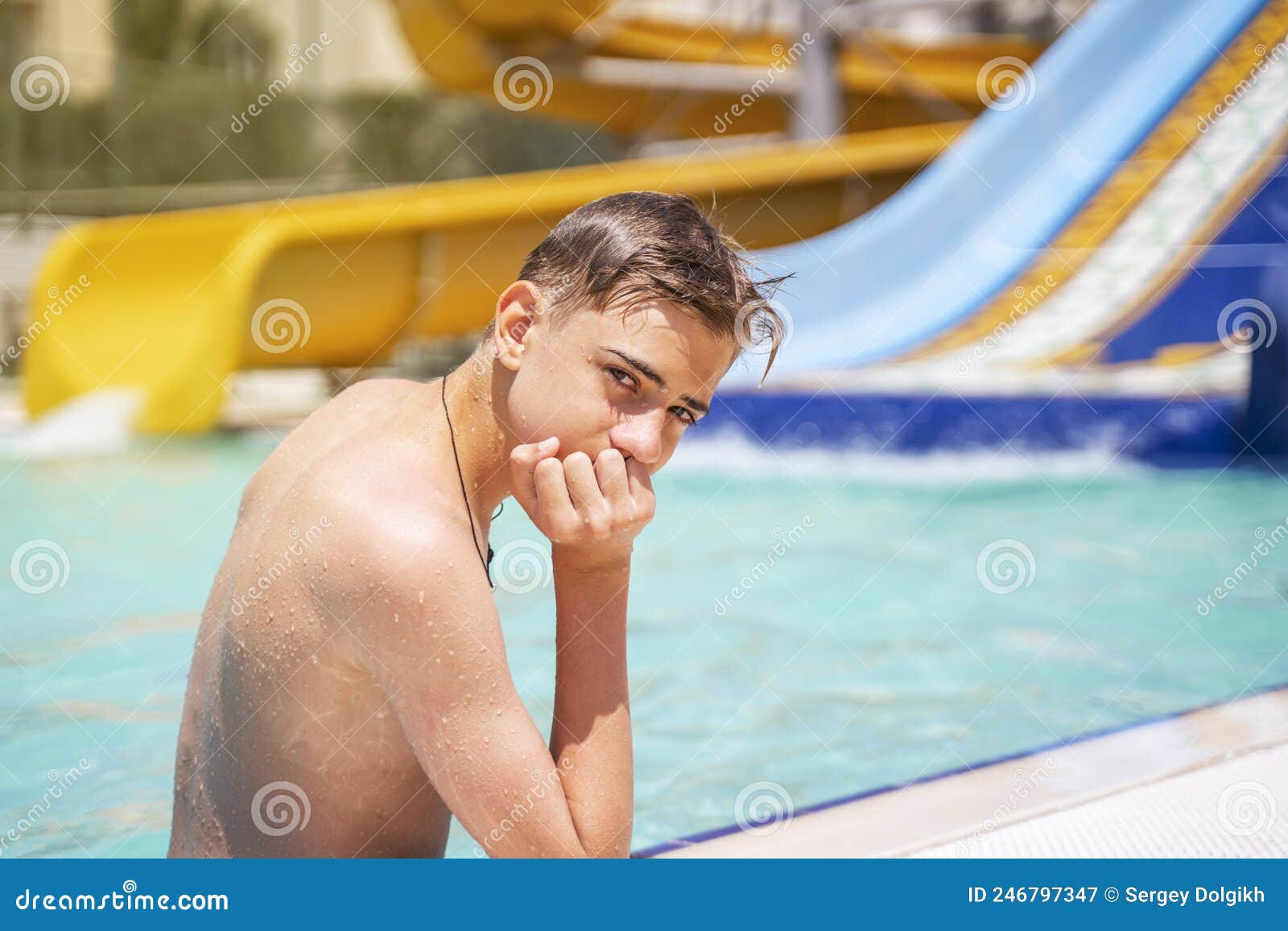 View from the Side of a Handsome Boy at the Edge of the Pool Stock ...