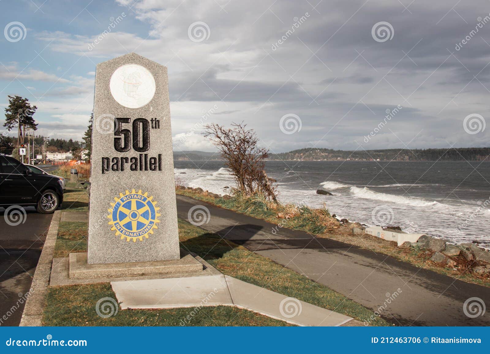 View of Sign 50th Parallel with Campbell River in the Background ...