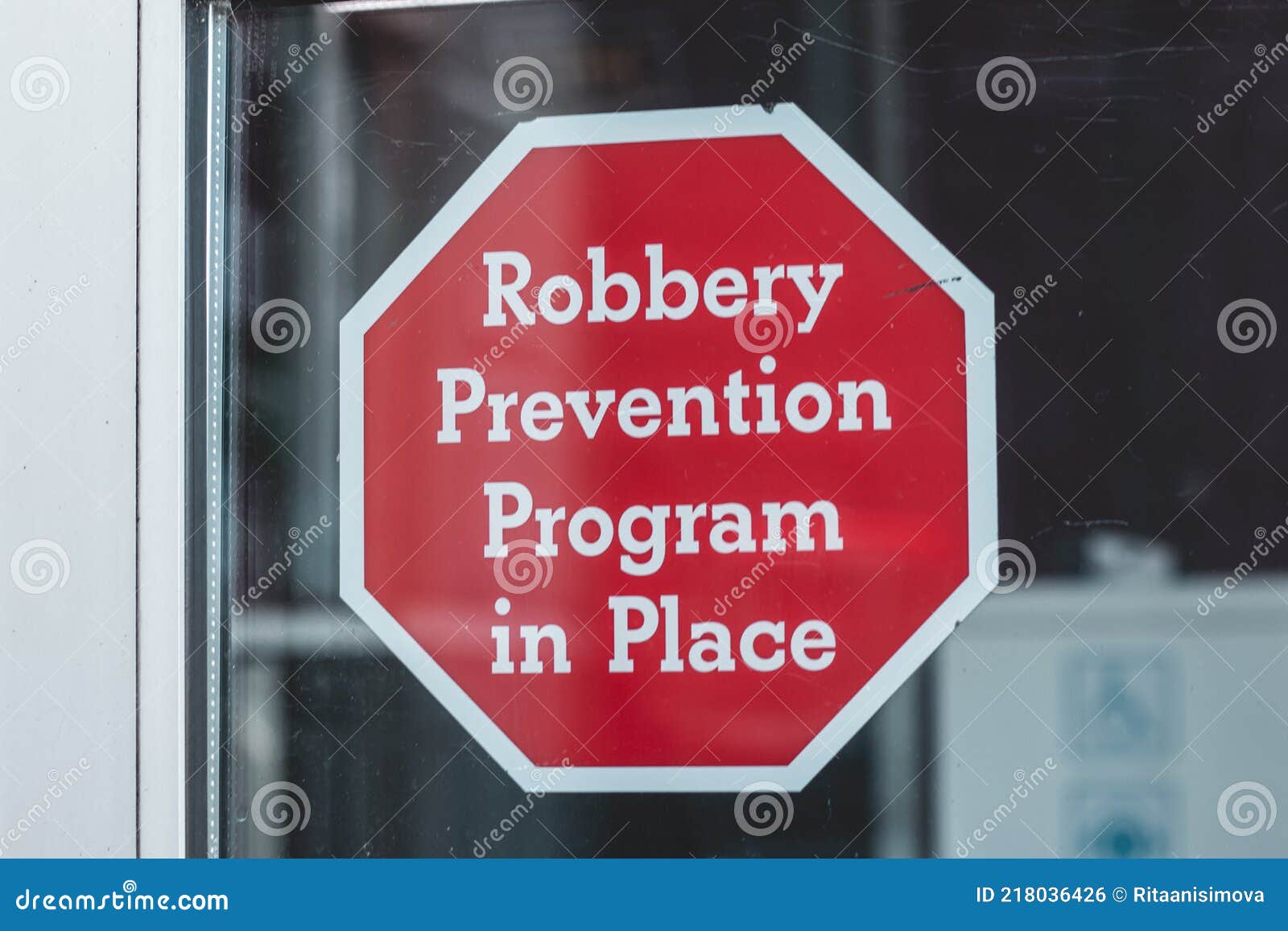 View of Sign on the Window Robbery Prevention Program in Place in ...