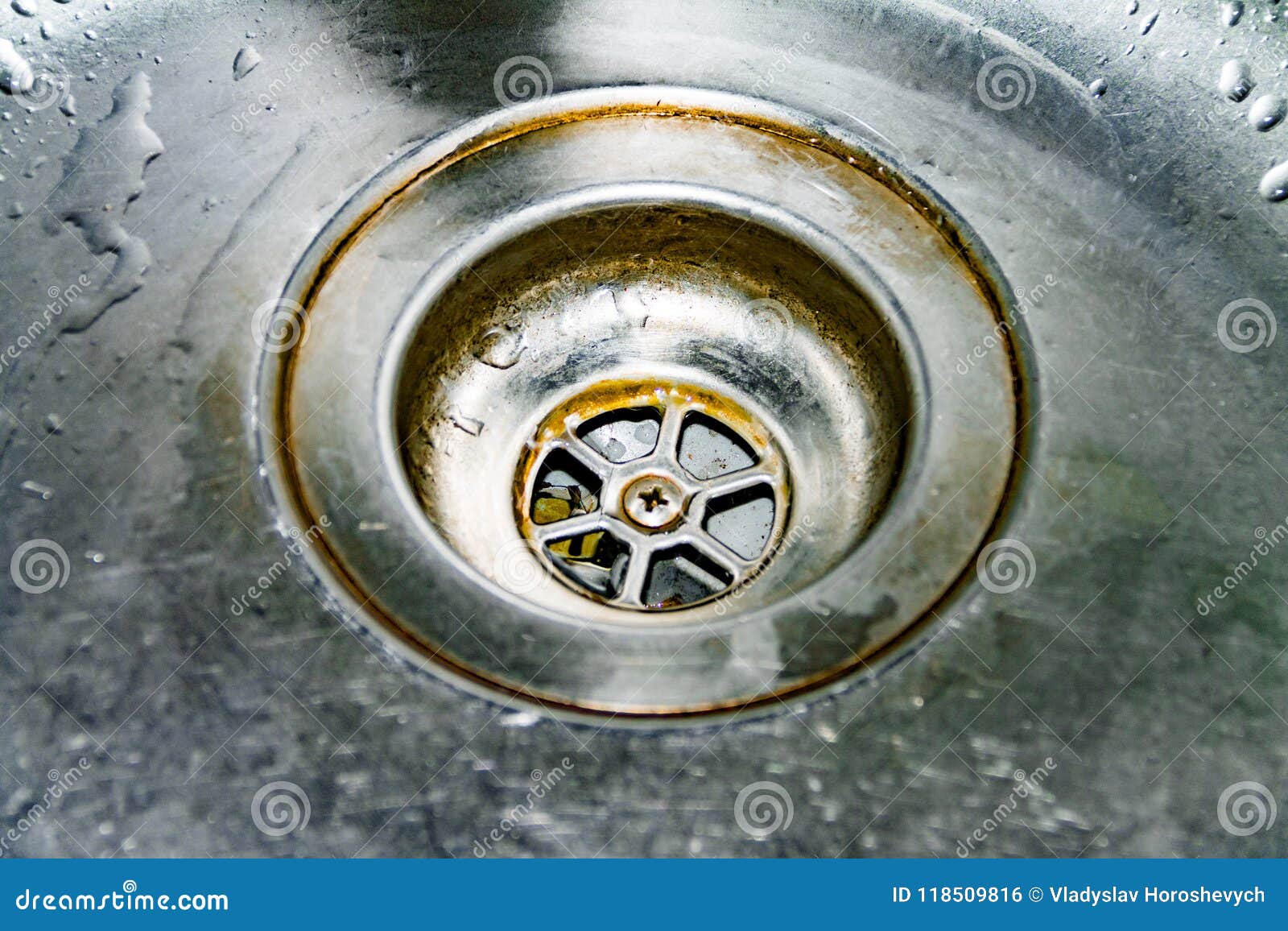 View Of The Sink Drain And Flowing Water For Background Close Up