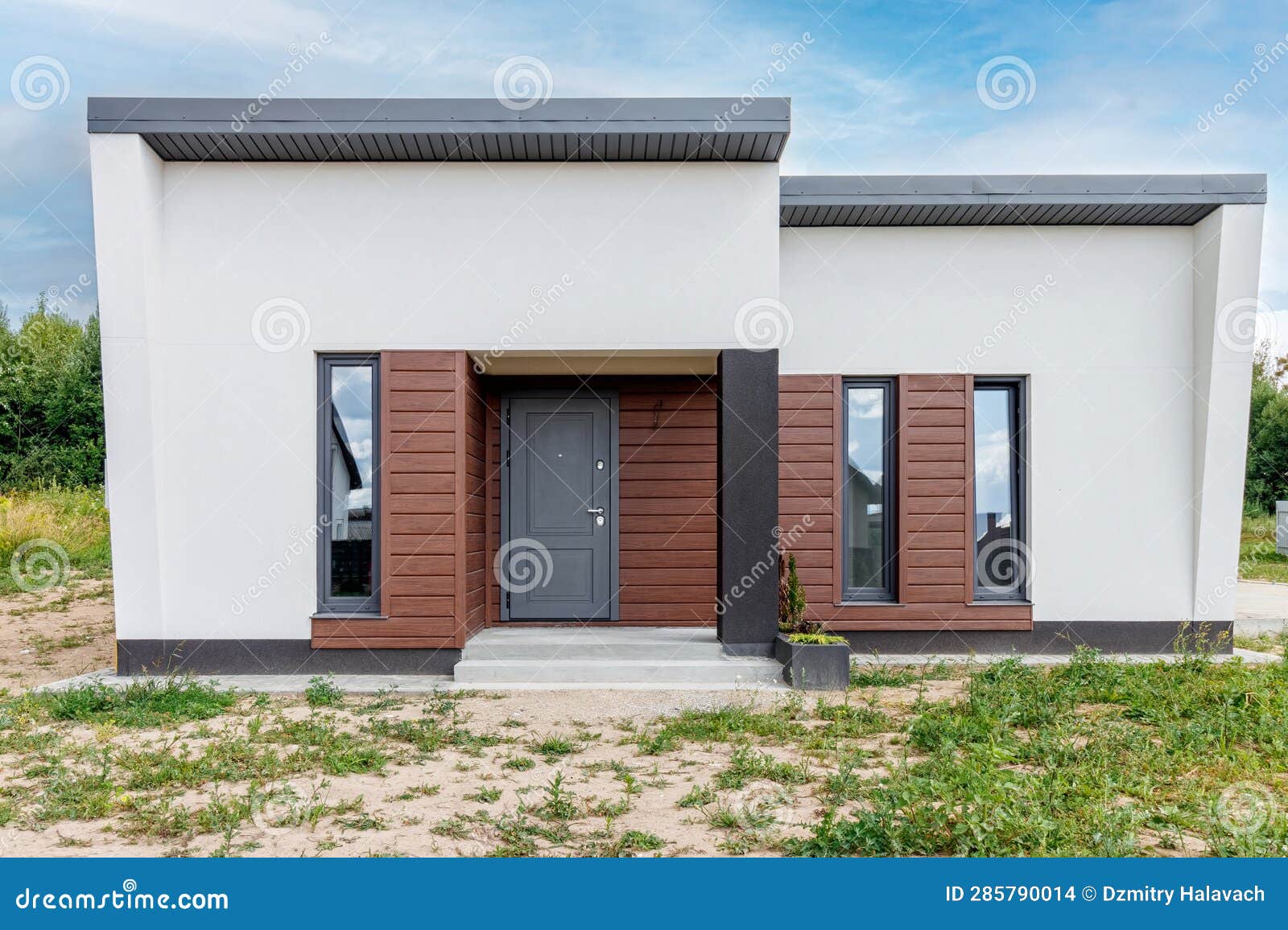 View of a Small Modern House Immediately after Construction. Step House ...