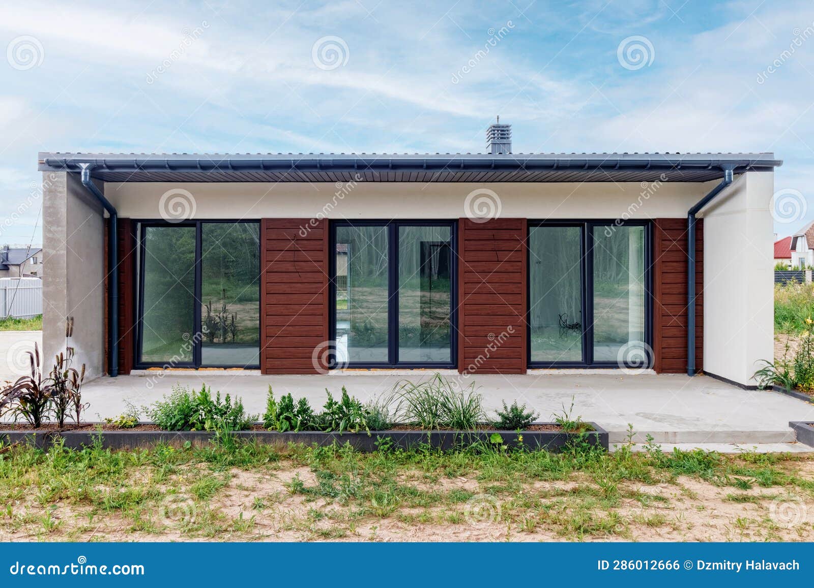 View of a Small Modern House Immediately after Construction. Step House ...