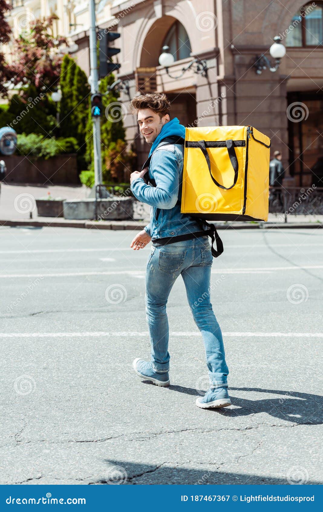 View of Smiling Courier with Backpack Stock Image - Image of jacket ...