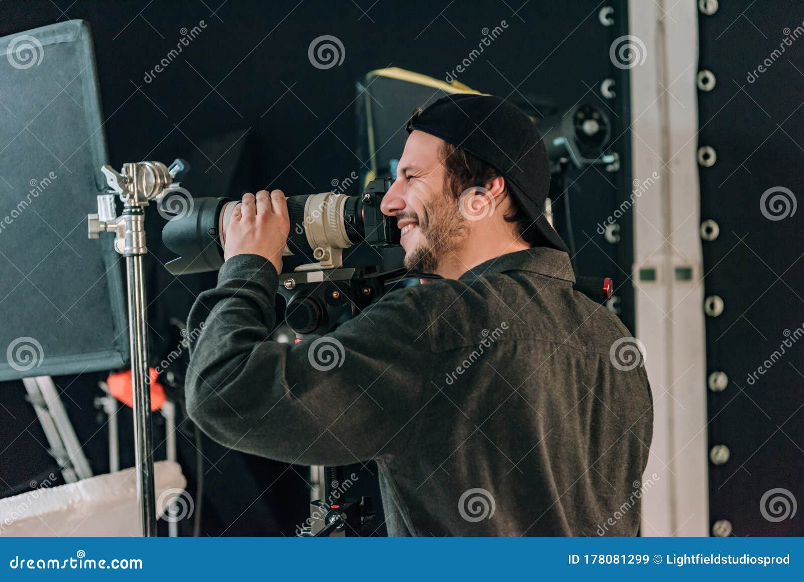 View of Smiling Handsome Cameraman Working in Photo Studio Stock Image ...