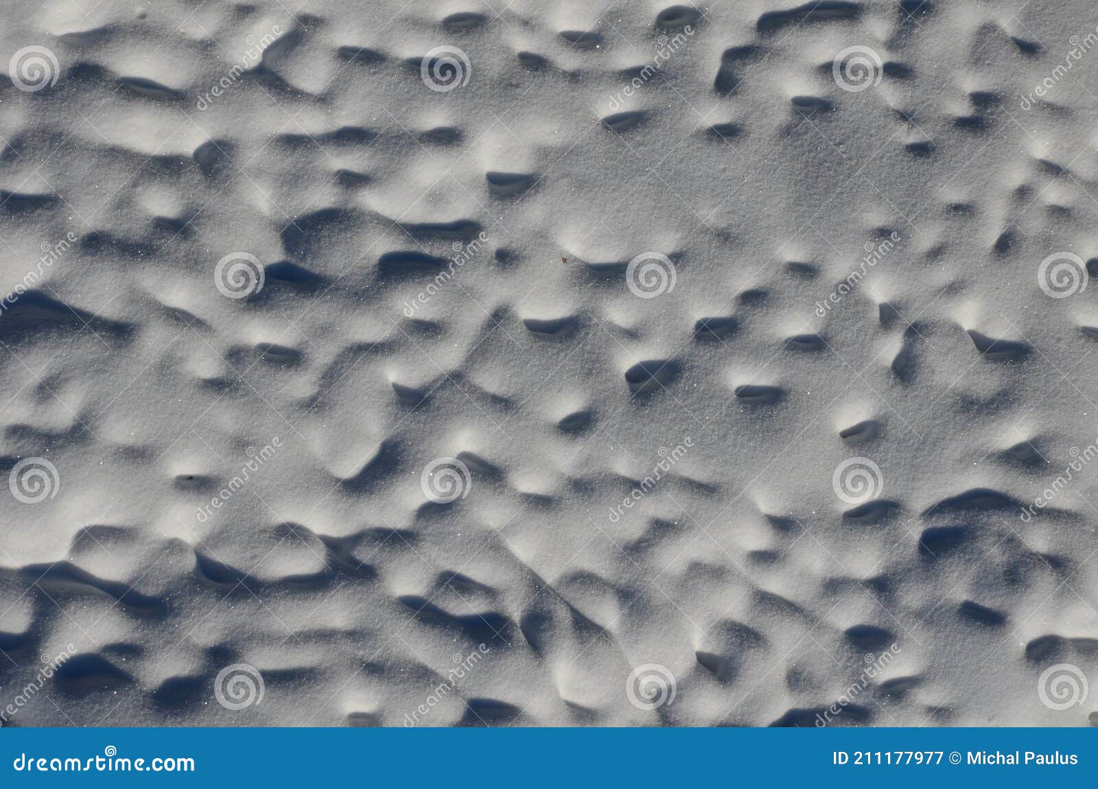 View of a Snowy Meadow with Long Snowy Human Footprints. Drone View ...