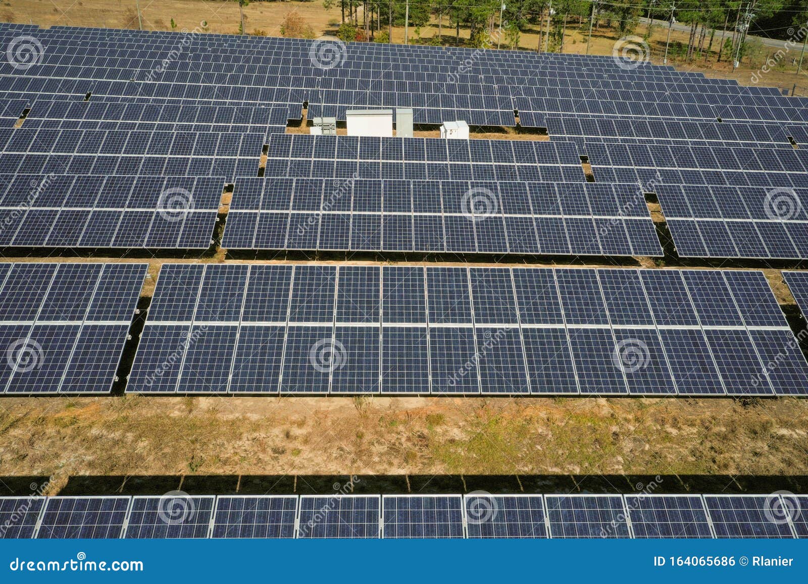 View of a Solar Farm with Rows of Panels Stock Photo - Image of panel ...