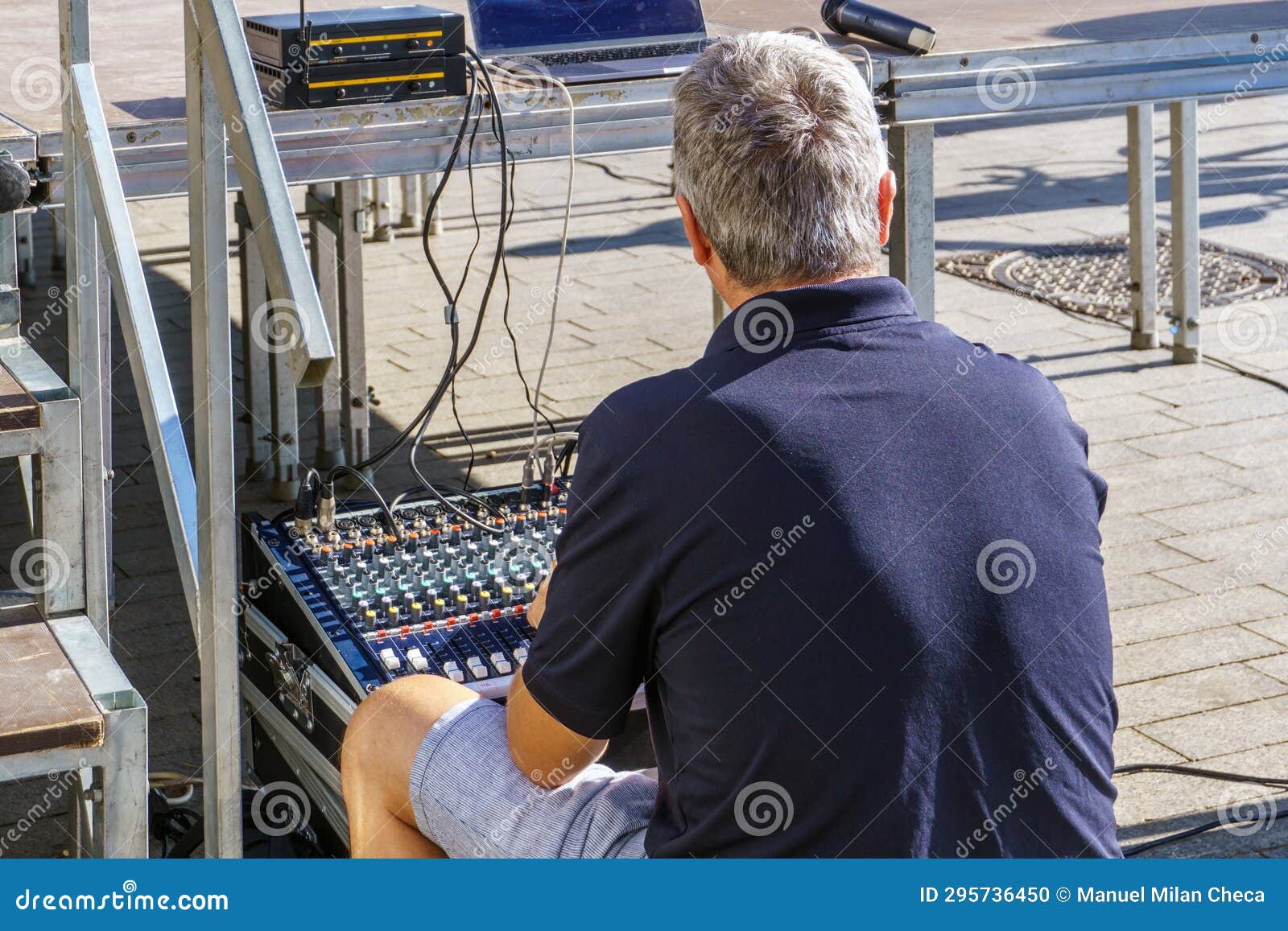 View of Sound Technician Operator Working at Mixing Console Workplace ...
