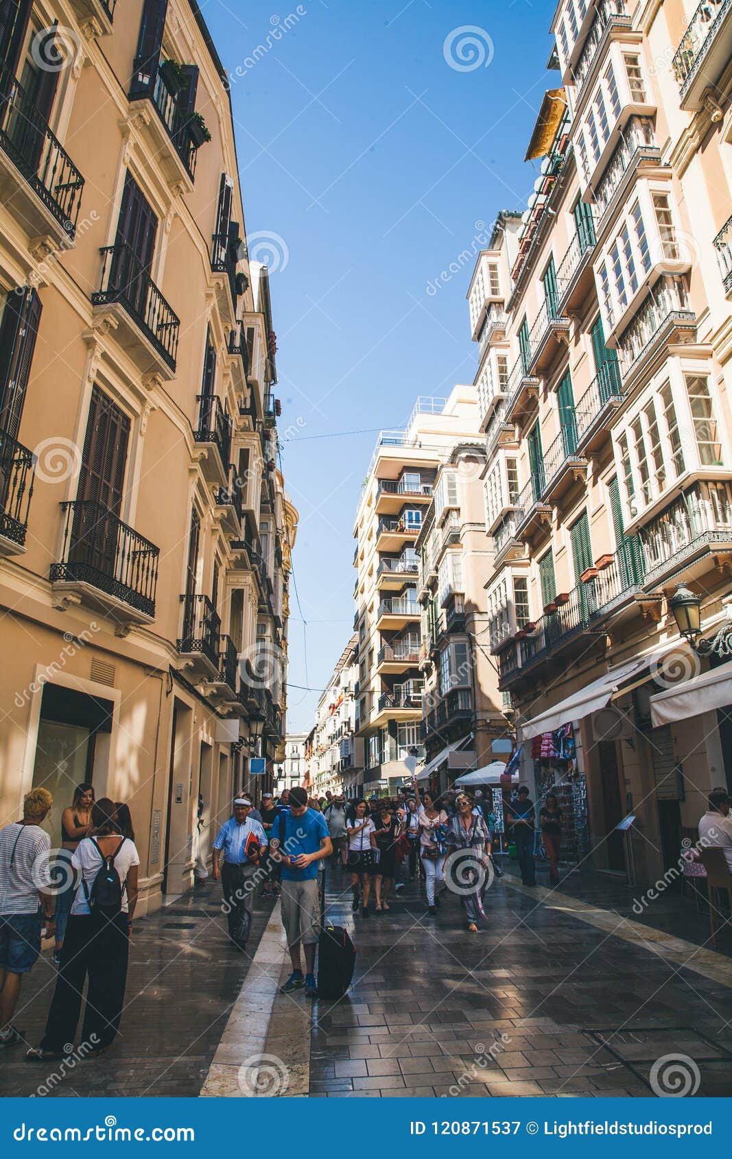 View of Spanish Street with People Under Editorial Photography - Image ...