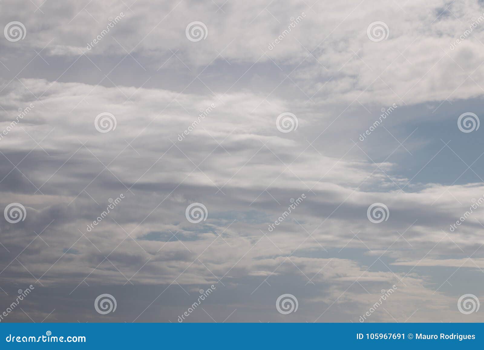 Sparse cloudy gray clouds stock image. Image of fluffy - 105967691