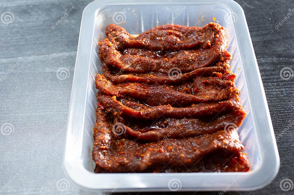 Raw Spicy Marinated Beef in Plastic Container Stock Image - Image of ...