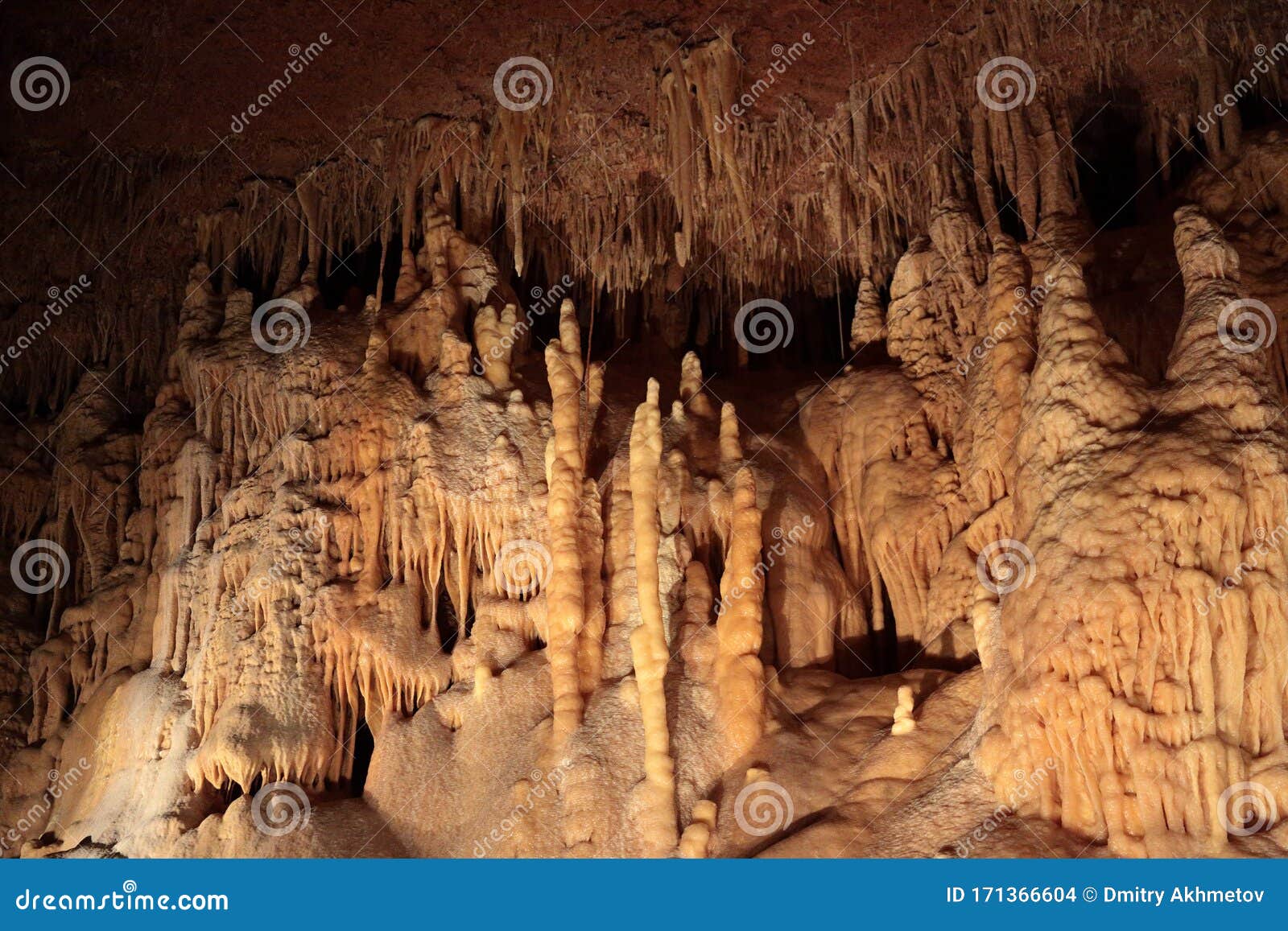 View Of Stalactites And Stalagmites In An Underground Cavern - Postojna ...