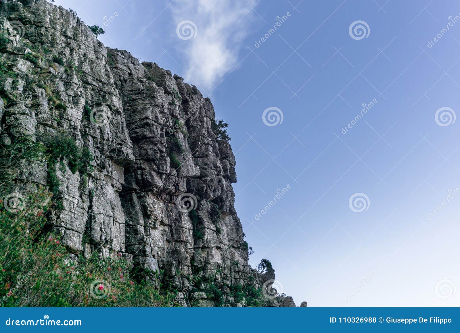 Top View Of Steep Mountain Cliffs And An Ice Cave. Royalty-Free Stock ...