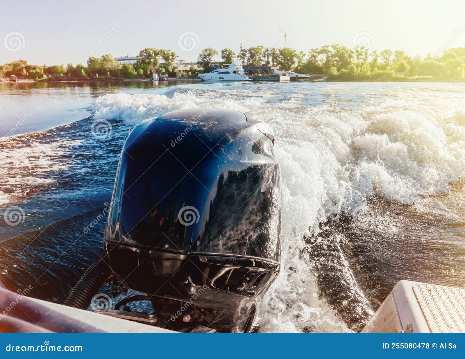 View of the Stern of a Motorboat Dinghy with a Outboard Engine Running ...