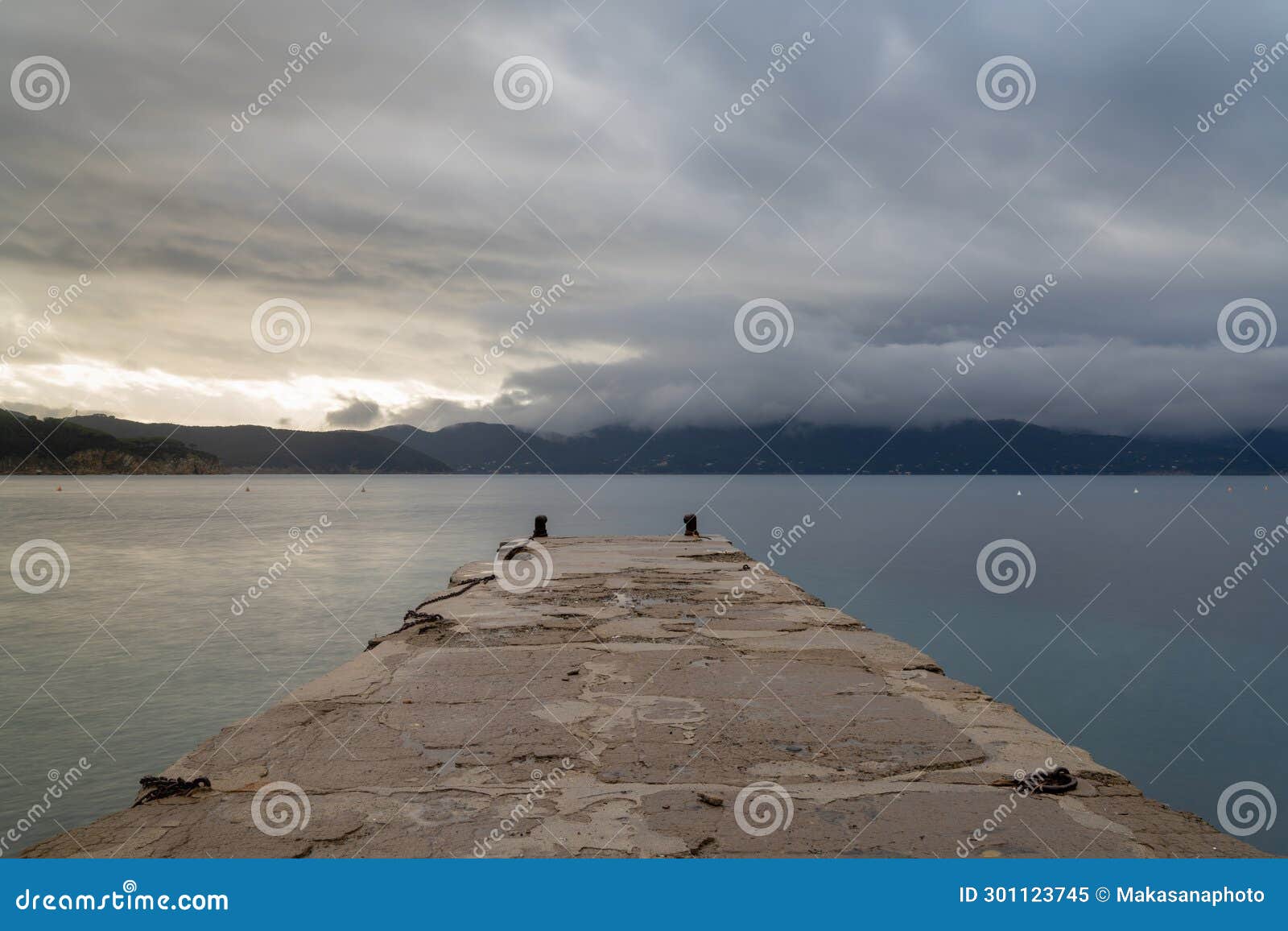 View of the Stone Dock Leading Out into the Ocean at Enfola Beach on ...