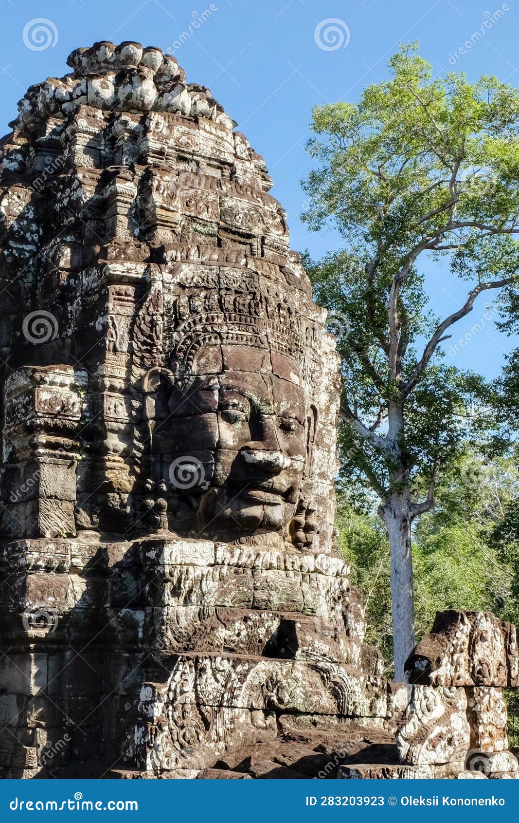 View of Stone Human Faces, a Notable Feature on the Towers of Khmer ...
