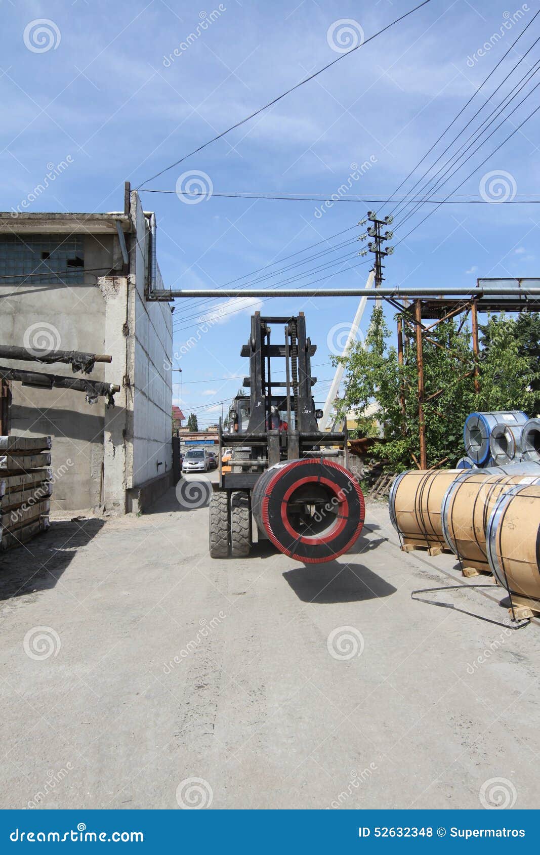 View Of The Storage Of Steel Coils With Loader Stock Photo - Image ...
