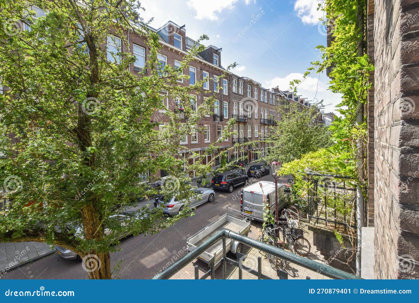 A View of a Street from a Balcony with Trees Editorial Photo - Image of ...