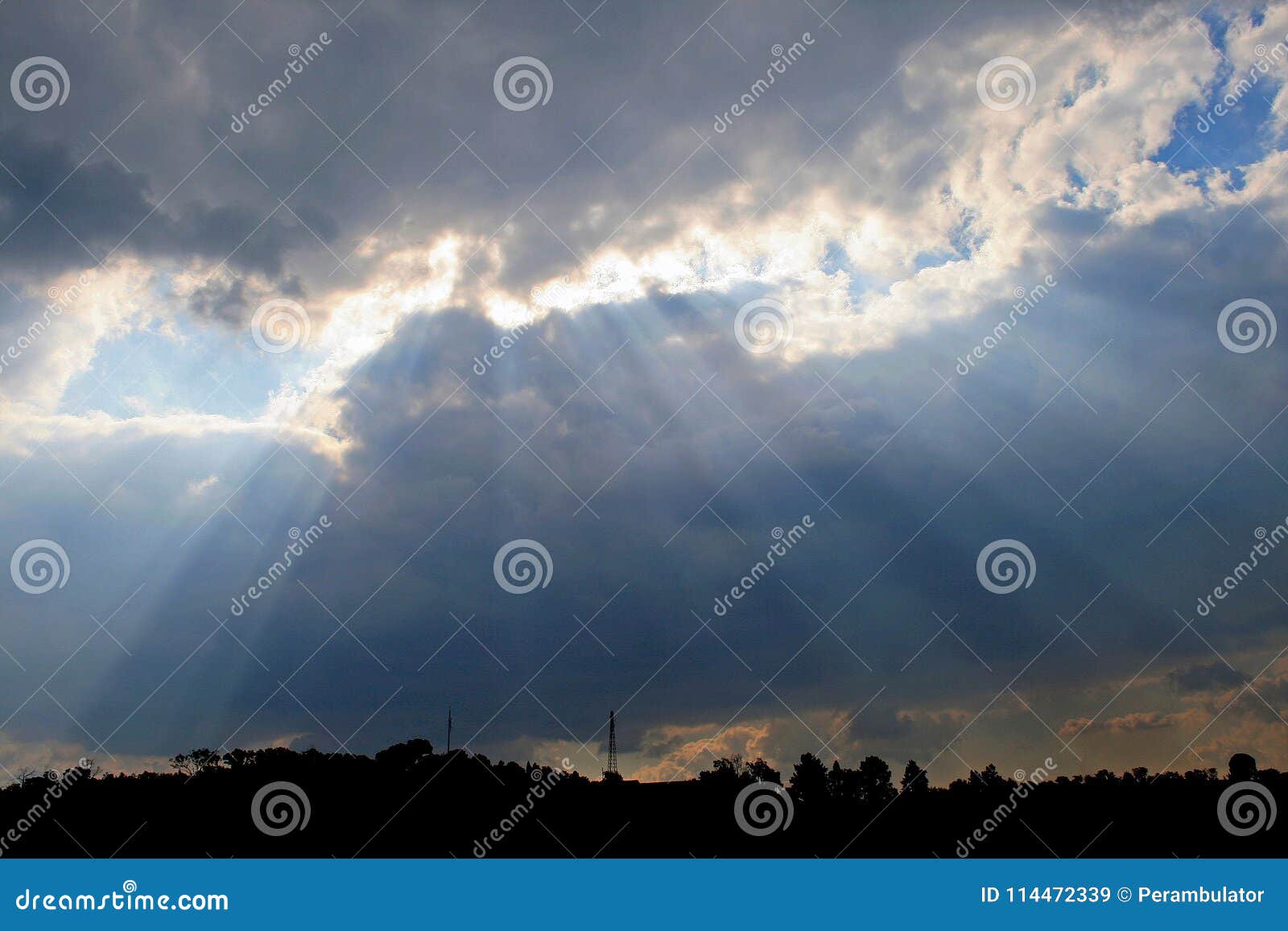 VIEW of SUN RAYS EMANATING from BEHIND CLOUDS Stock Image - Image of ...