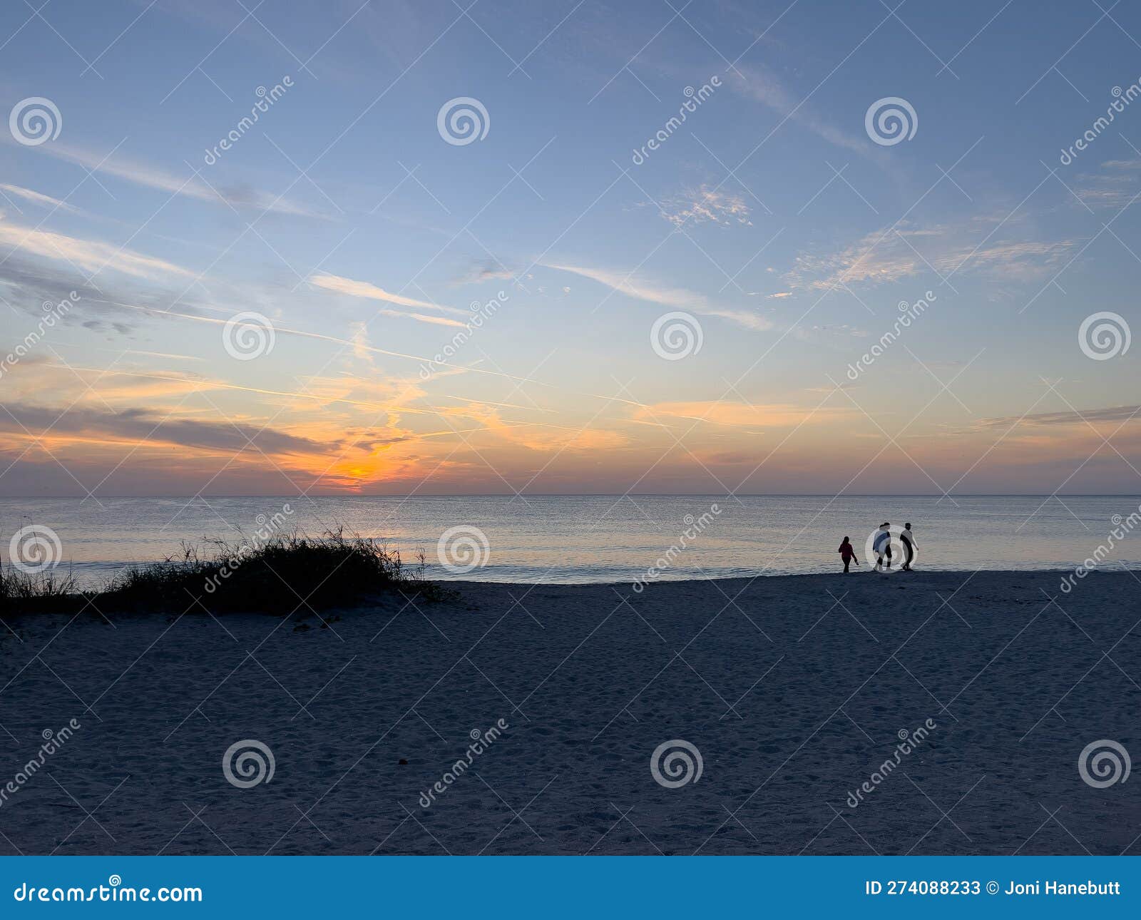A View of a Sunset on the Beach at Siesta Key, Florida with a Blue ...