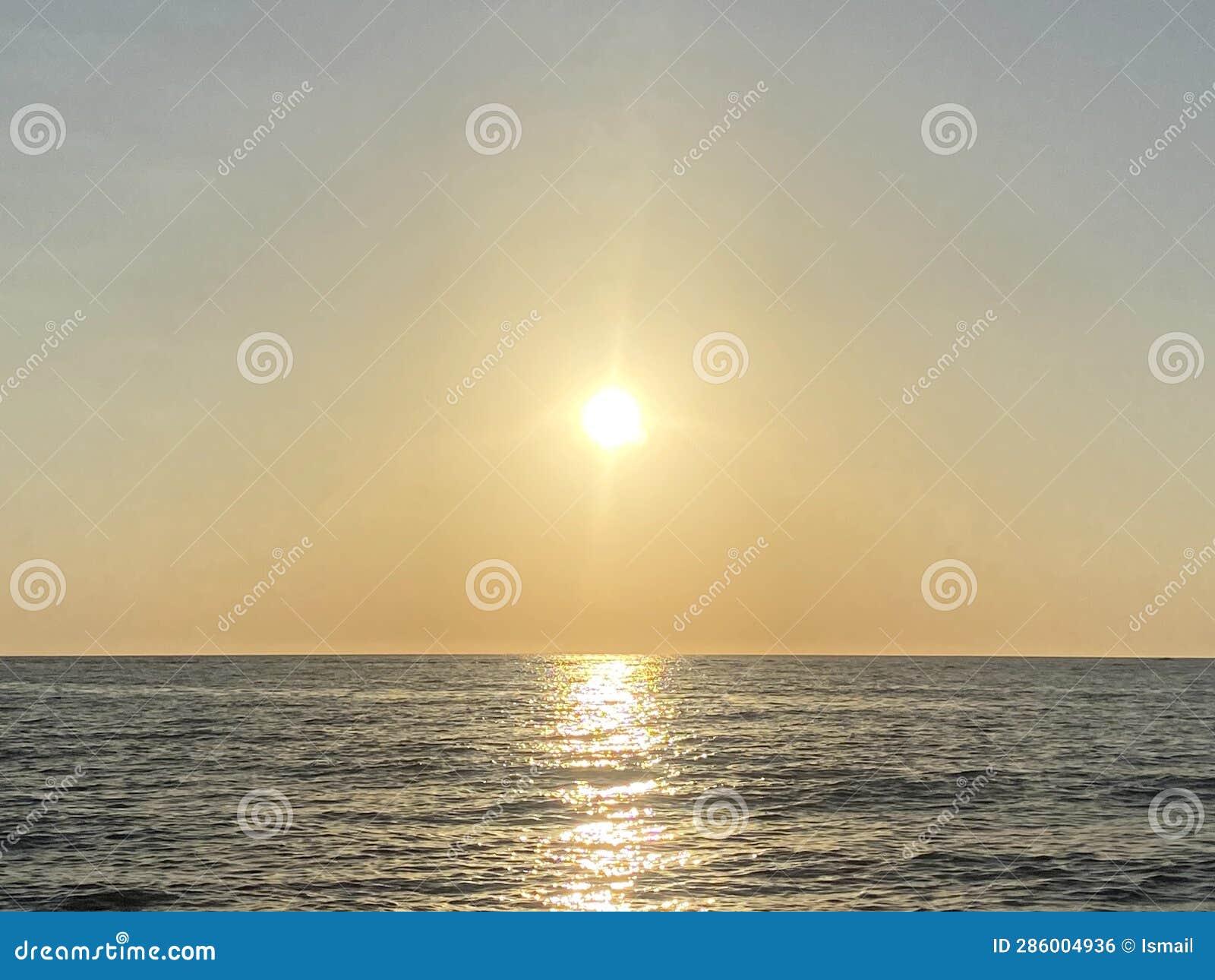 View Of The Sunset On The Edge Of Tanjung Bayang Beach. Stock ...