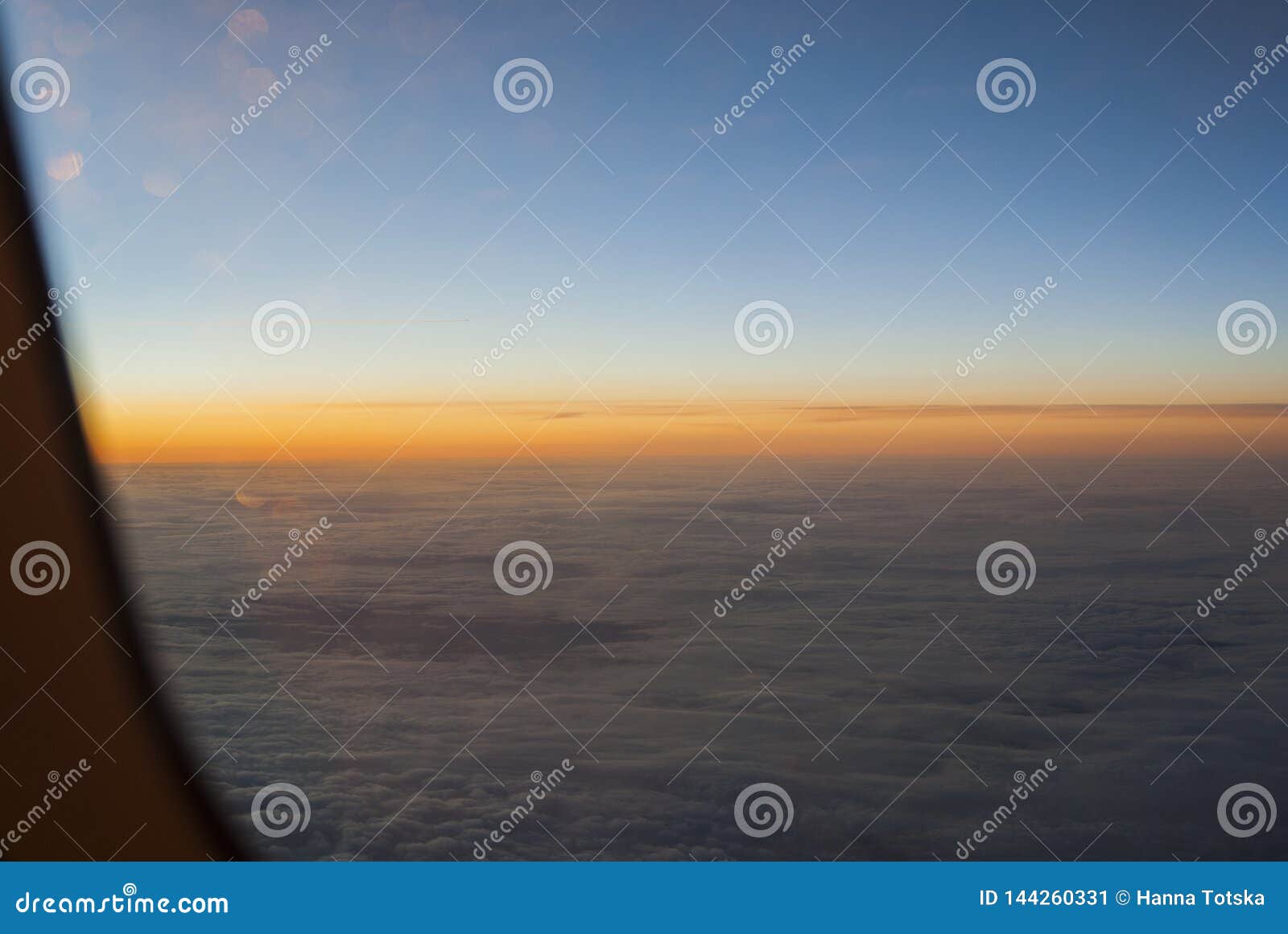 A View of the Sunset Sky through an Airplane Window Stock Image - Image ...