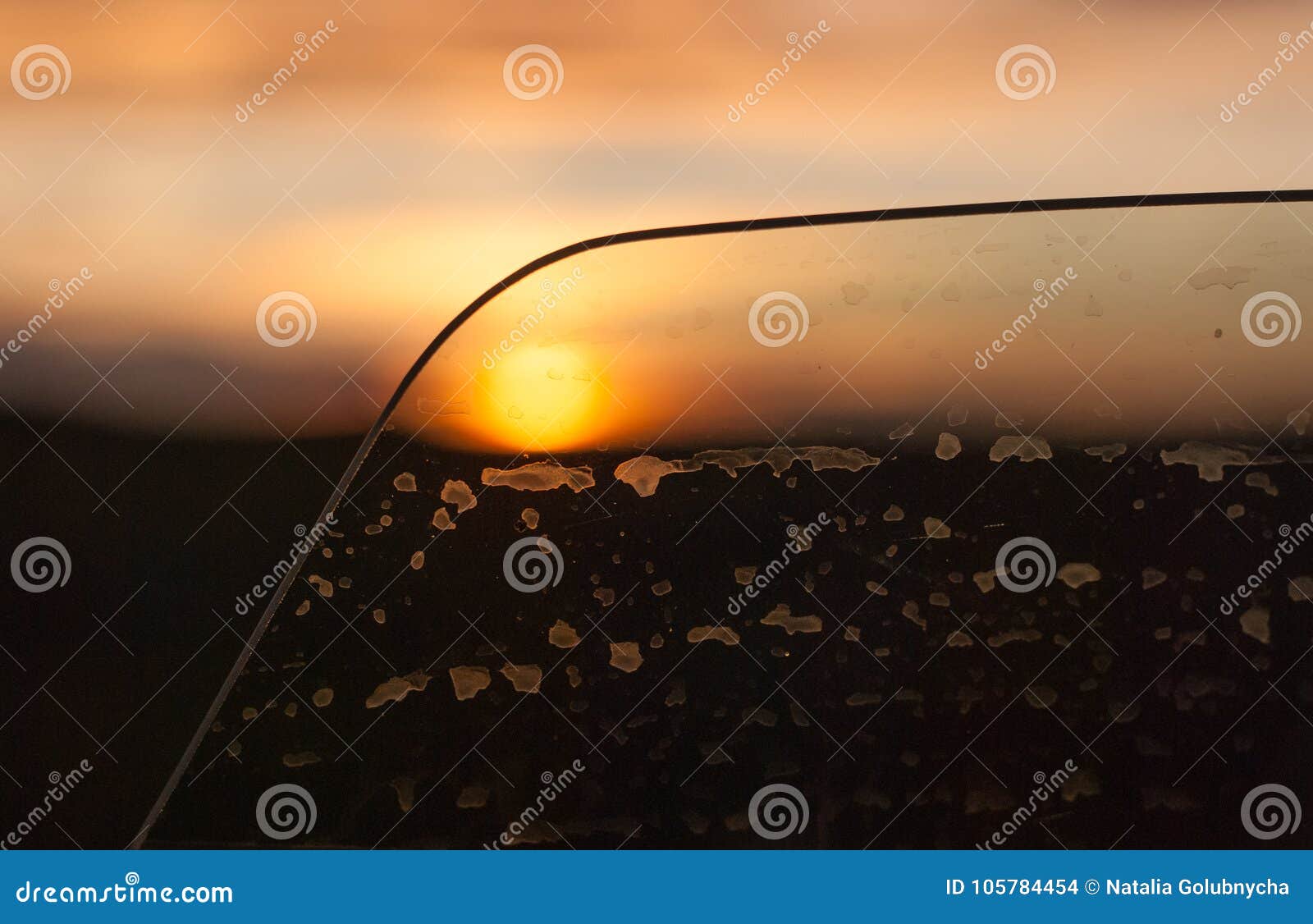 View of the Sunset through a Slightly Open Car Window Stock Photo ...