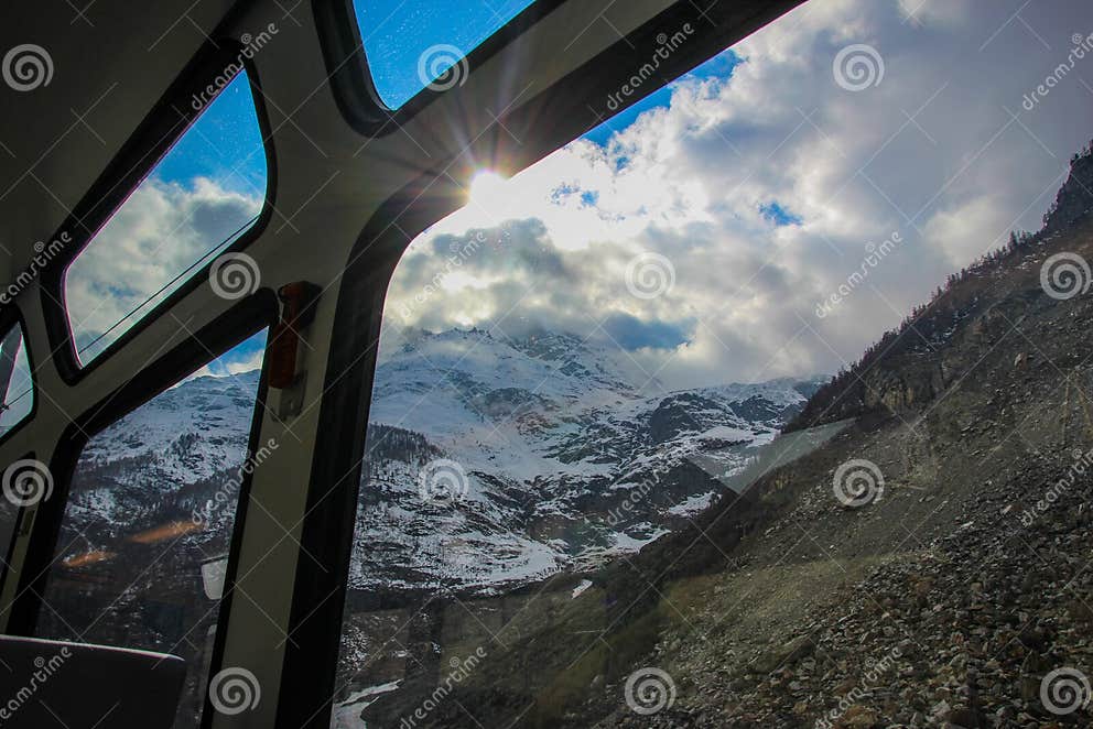 View of Swiss Alps from Inside Train Stock Photo - Image of landscape ...
