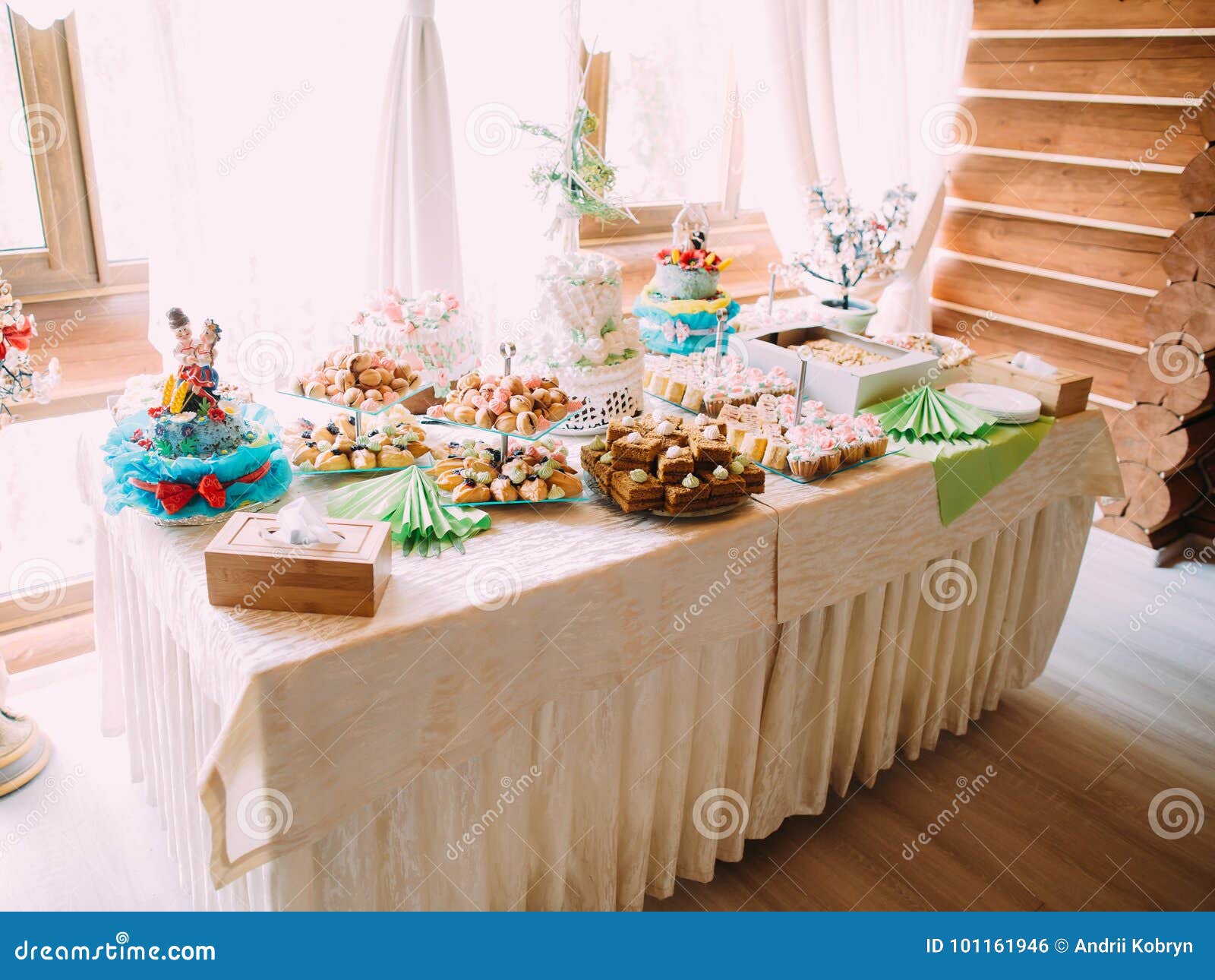 The View of the Table Set Full of Diffeerent Cakes, Cupcakes and ...