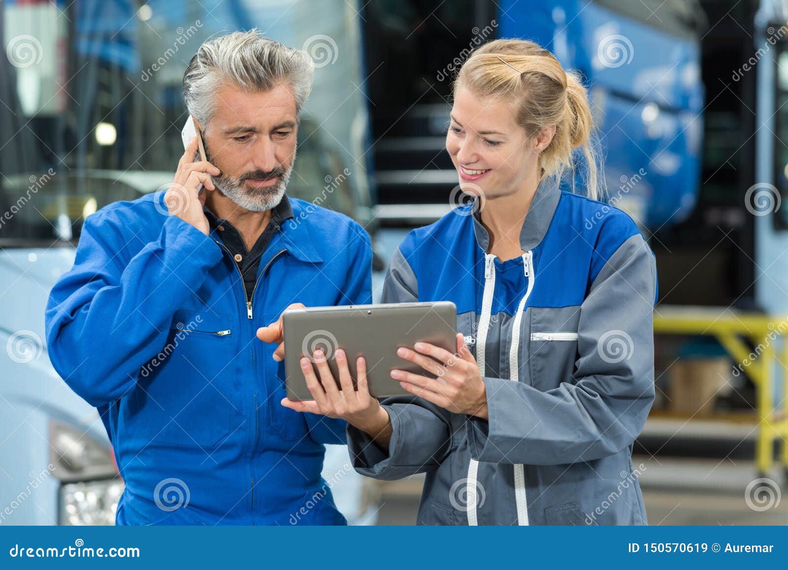 View Team Mechanics Working at Garage Stock Image - Image of digital ...