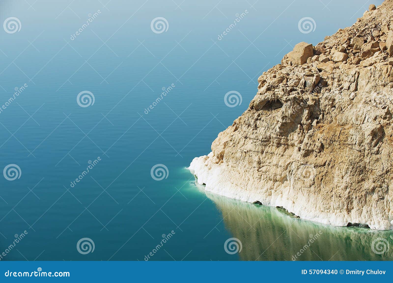 View To the Cliff at the Dead Sea Shore with Reflection in the Water in ...