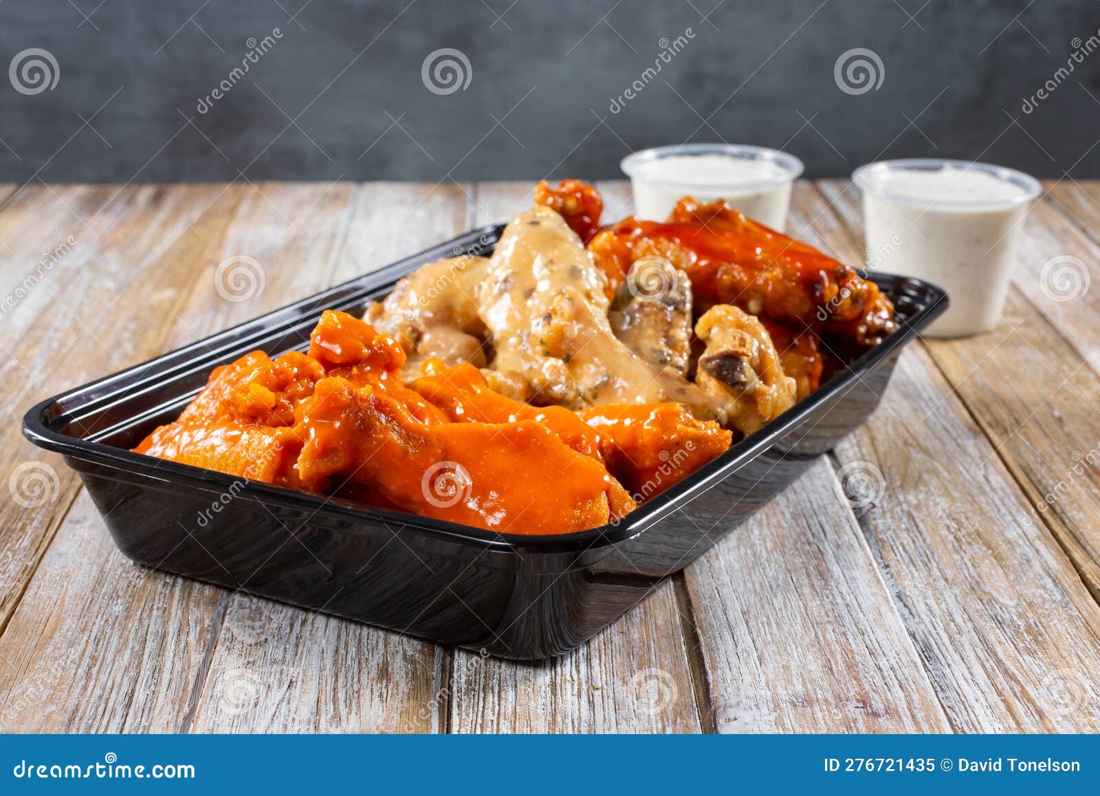 Plastic Container of Assorted Chicken Wings, Wing Sampler Stock Image ...