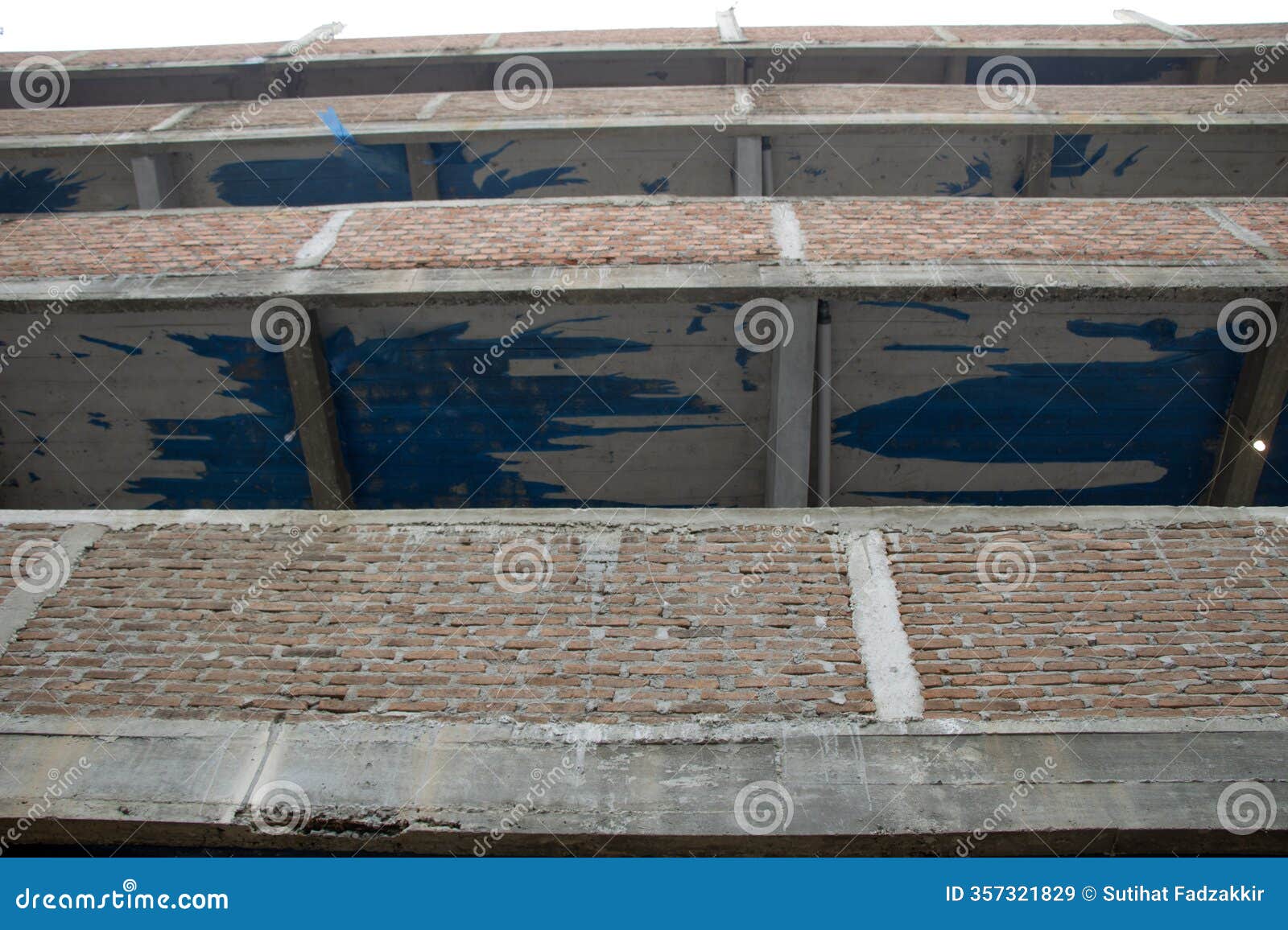 View from the Top of the Fence of an Unfinished Red Brick Multi-storey ...