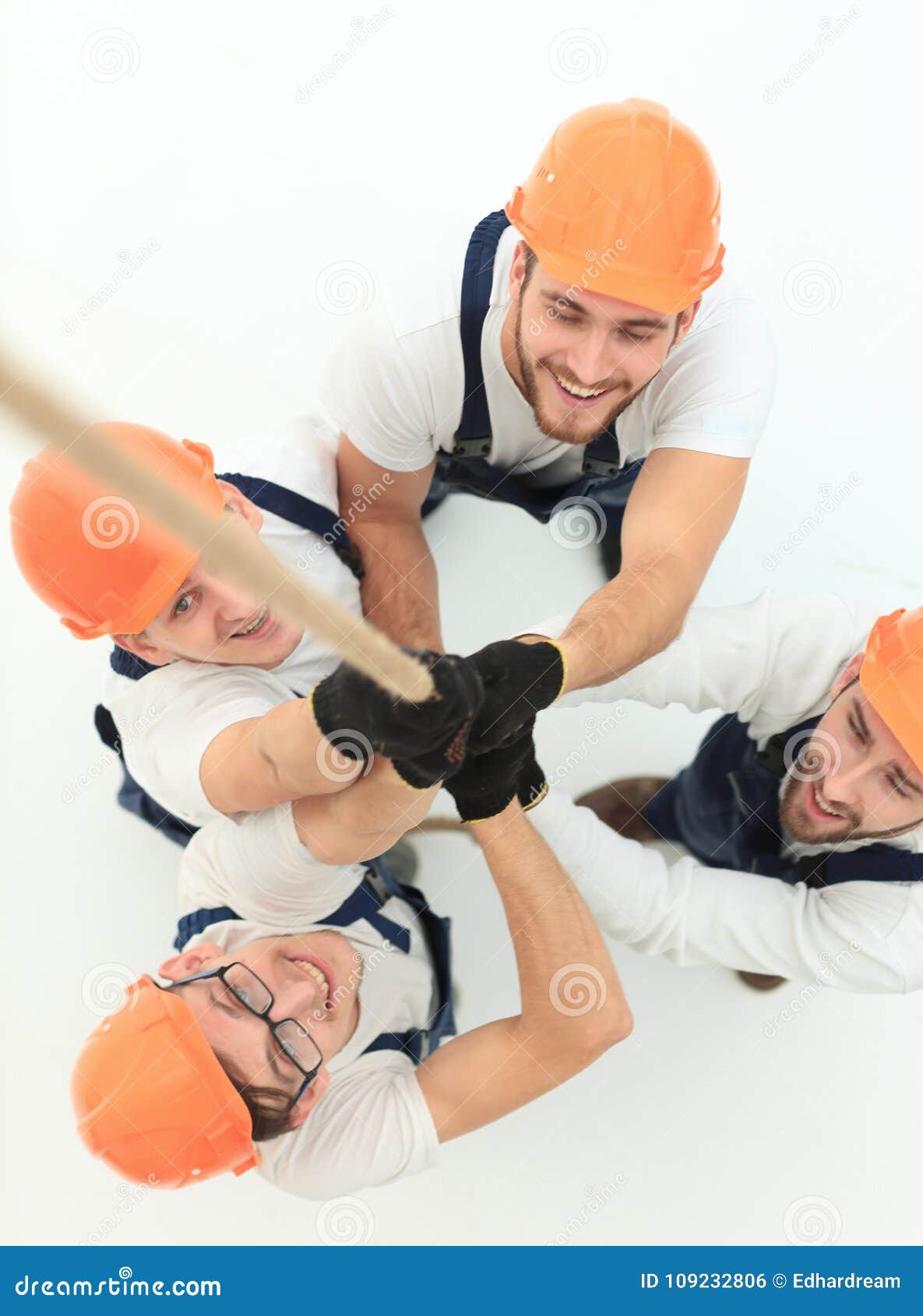 View from the Top.a Group of Workers Pulling a Rope Stock Photo - Image ...