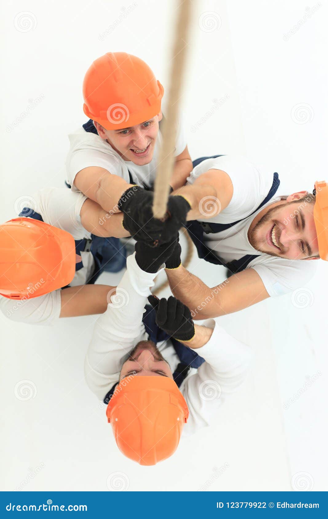 View from the Top.a Group of Workers Pulling a Rope Stock Photo - Image ...