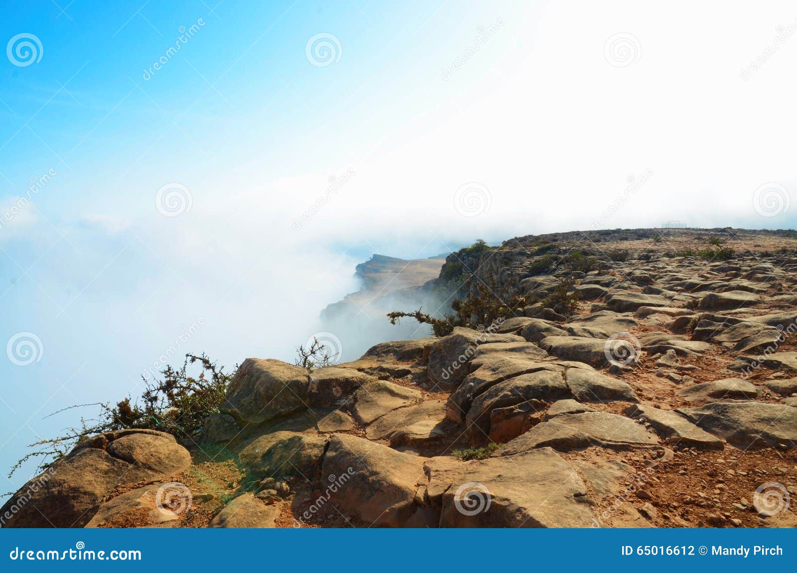 View on Top of a Mountain Over the Clouds Stock Photo - Image of oman ...