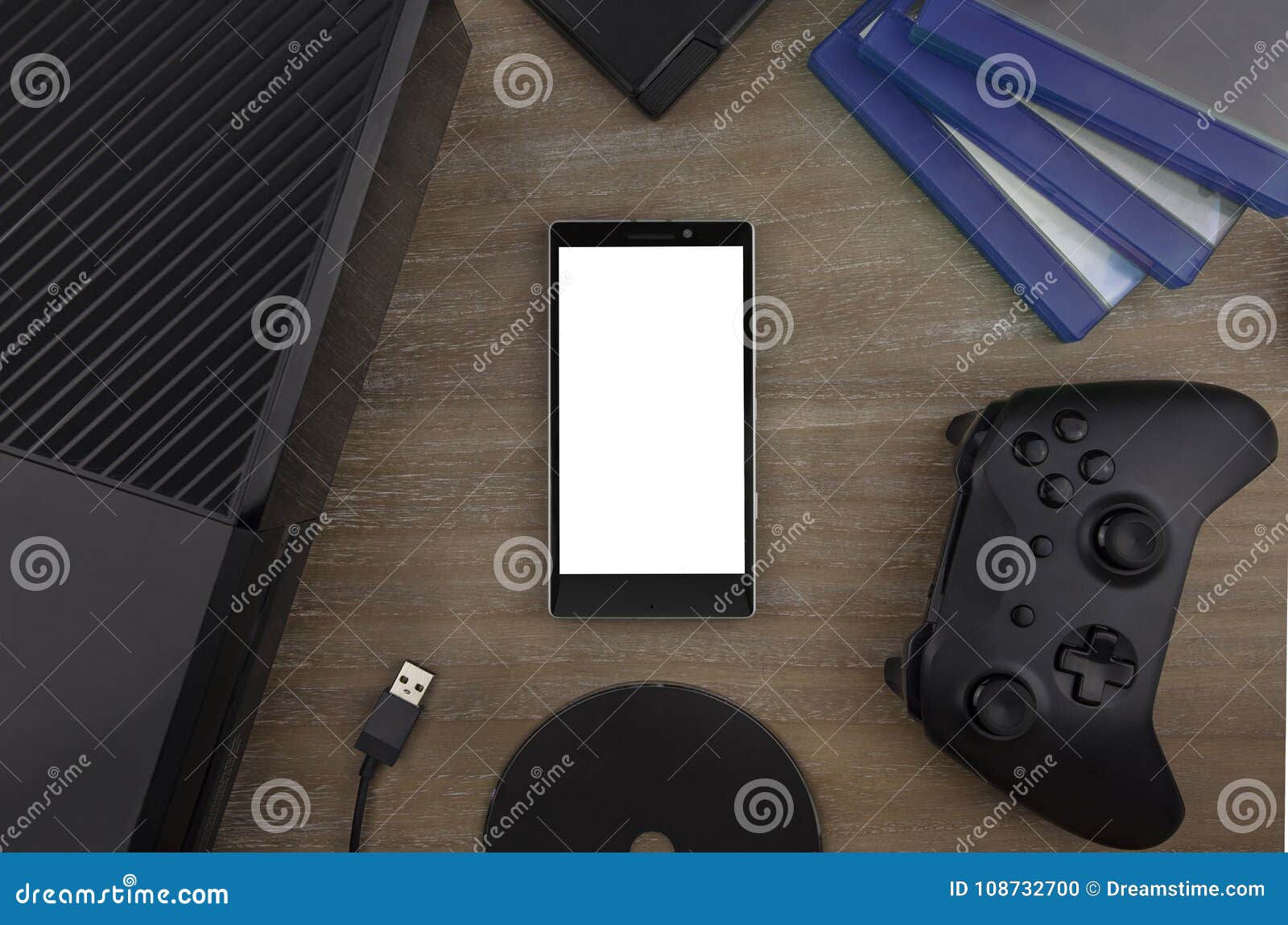 View from the Top on Smart Phone, Game Console, Game Pad, Game Discs ...