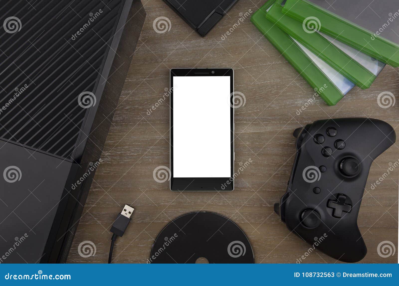 View from the Top on Smart Phone, Game Console, Game Pad, Game Discs ...